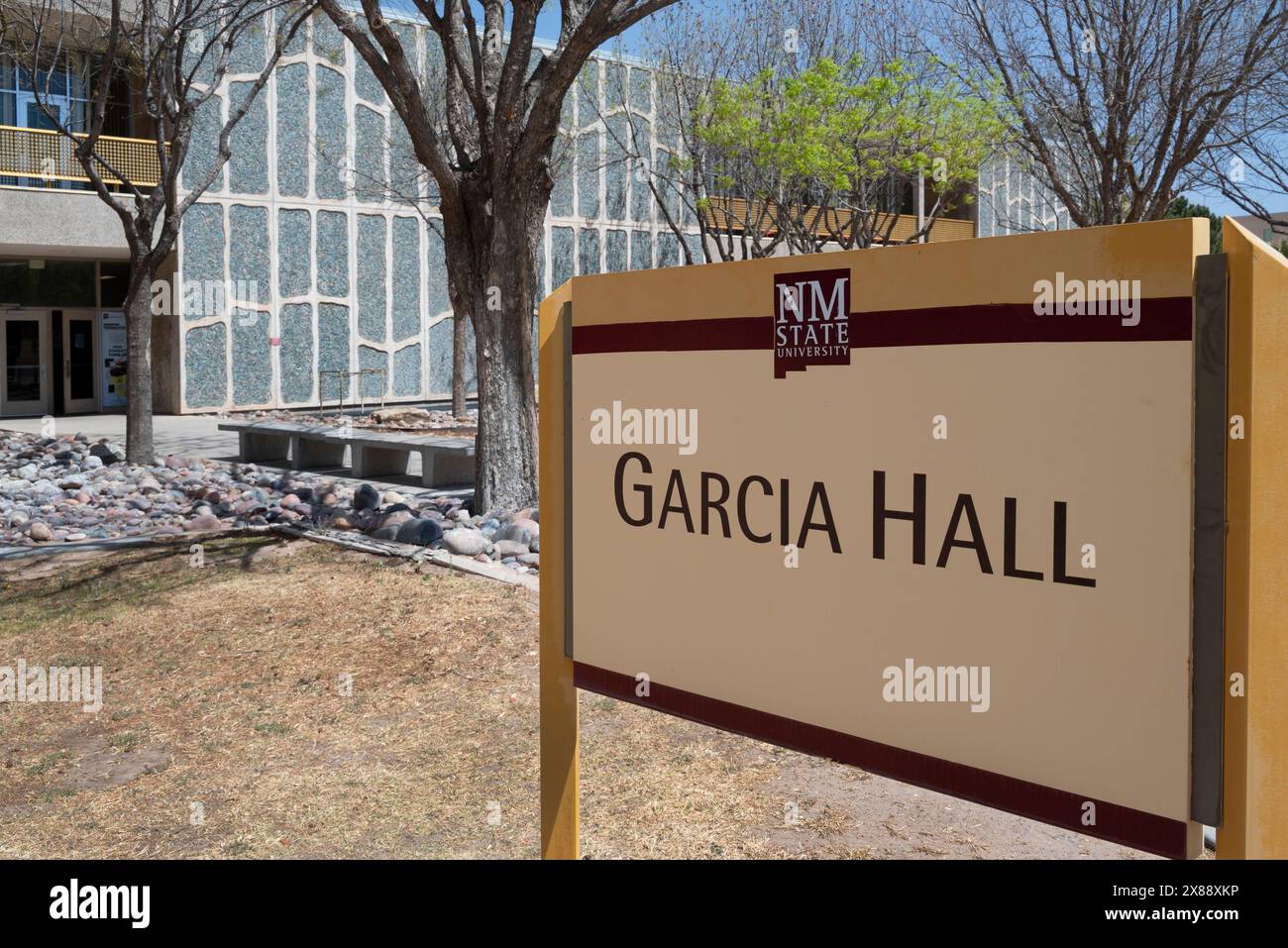 Large Sign for Garcia Hall sits afront building with turquoise inlaid ...