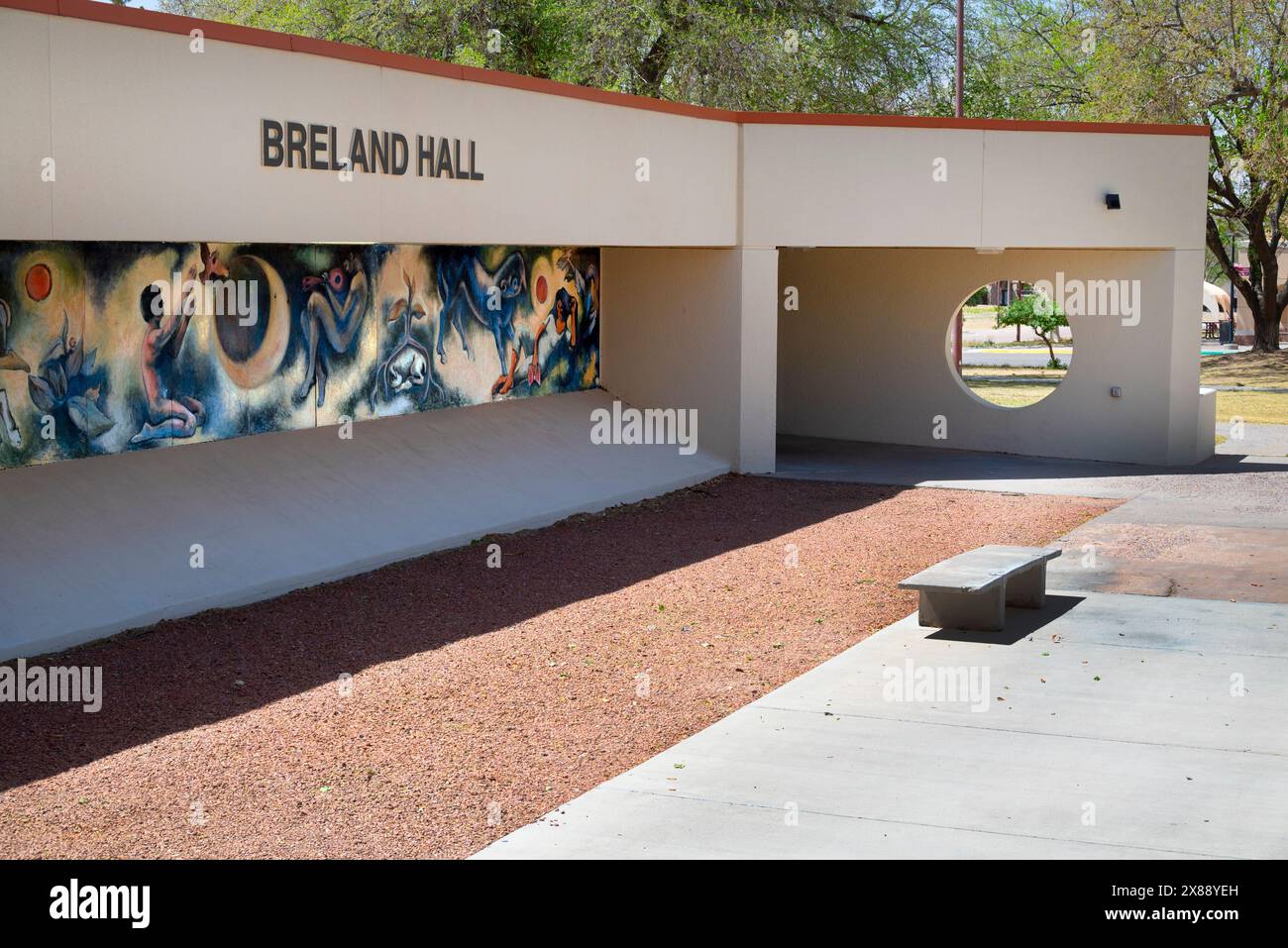 Breland Hall with circular window and colorful mural on exterior of ...