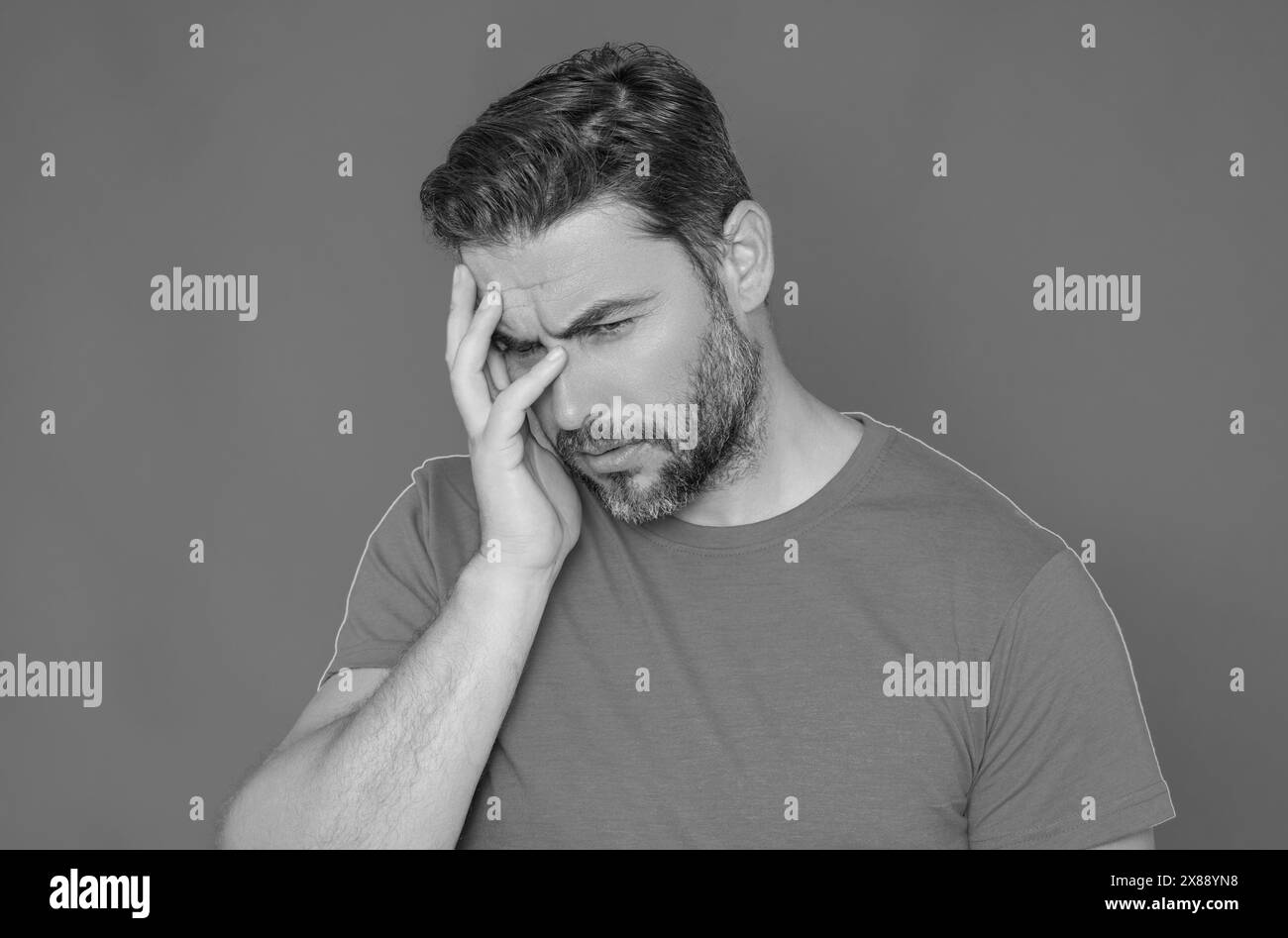 Portrait of thoughtful guy making choice. Handsome man thinking on ...