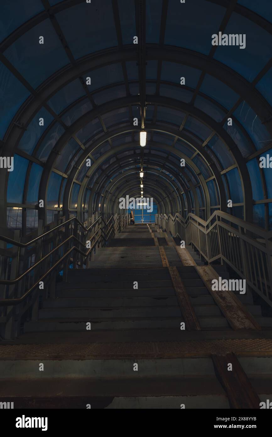 A pedestrian crossing at sunset. Tunnel Shot using a wide angle lens ...