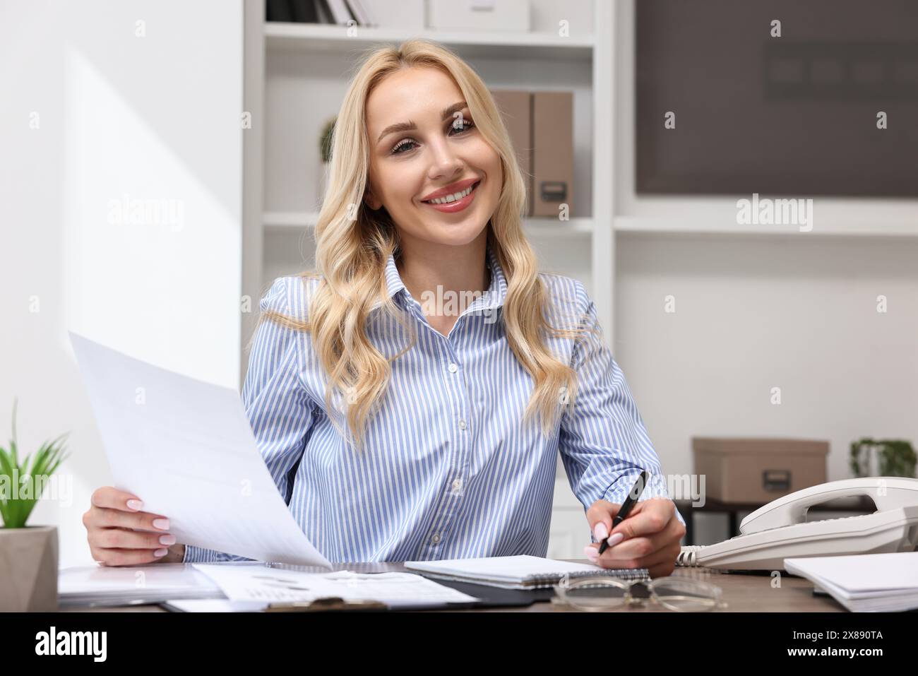 Happy entrepreneur document taking hi-res stock photography and images ...
