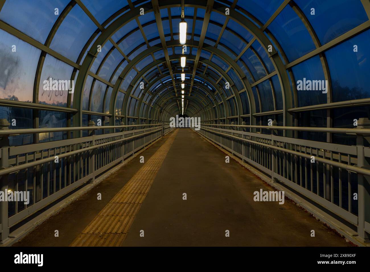 A pedestrian crossing at sunset. Tunnel Shot using a wide angle lens ...