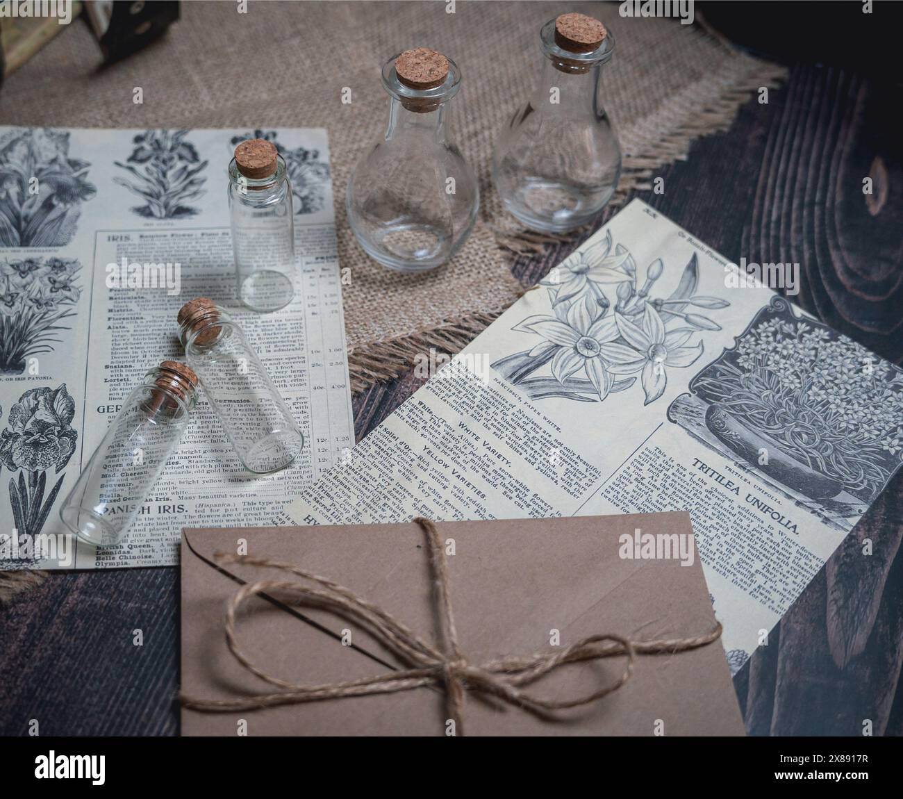 Mystical still life in vintage style with empty flasks, letters and ...