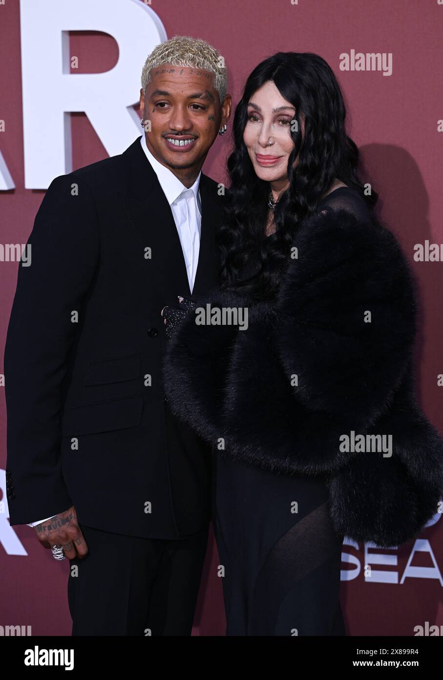 Cannes, France. May 23rd, 2024. Alexander 'AE' Edwards and Cher ...