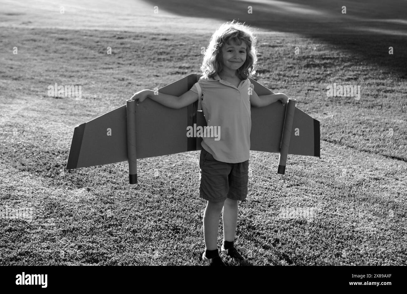 Child playing with toy jetpack. Child pilot astronaut or spaceman ...