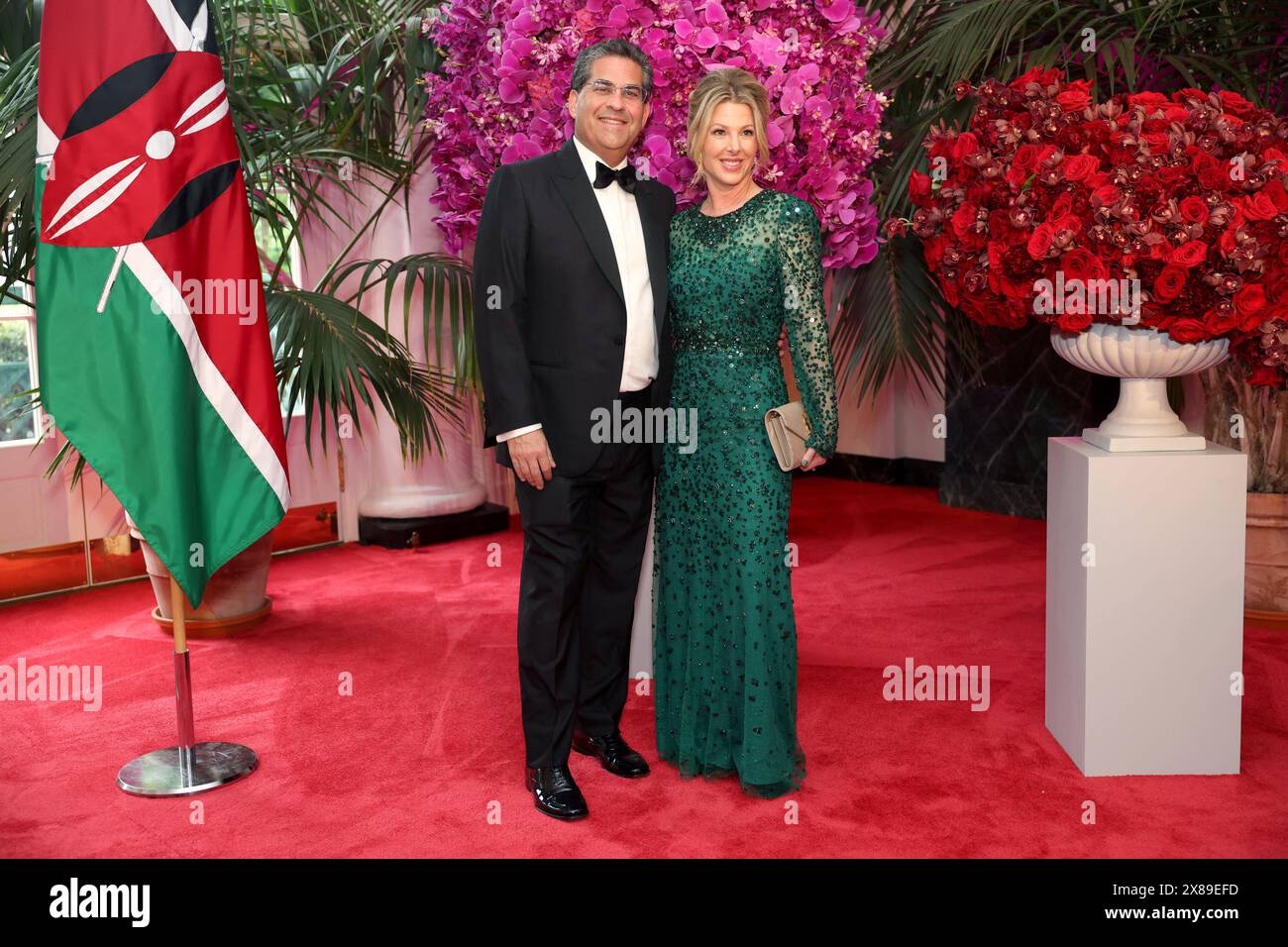Eric Baker, co-founder of StubHub, left, and Nicole Cooper Baker arrive to attend a state dinner ...