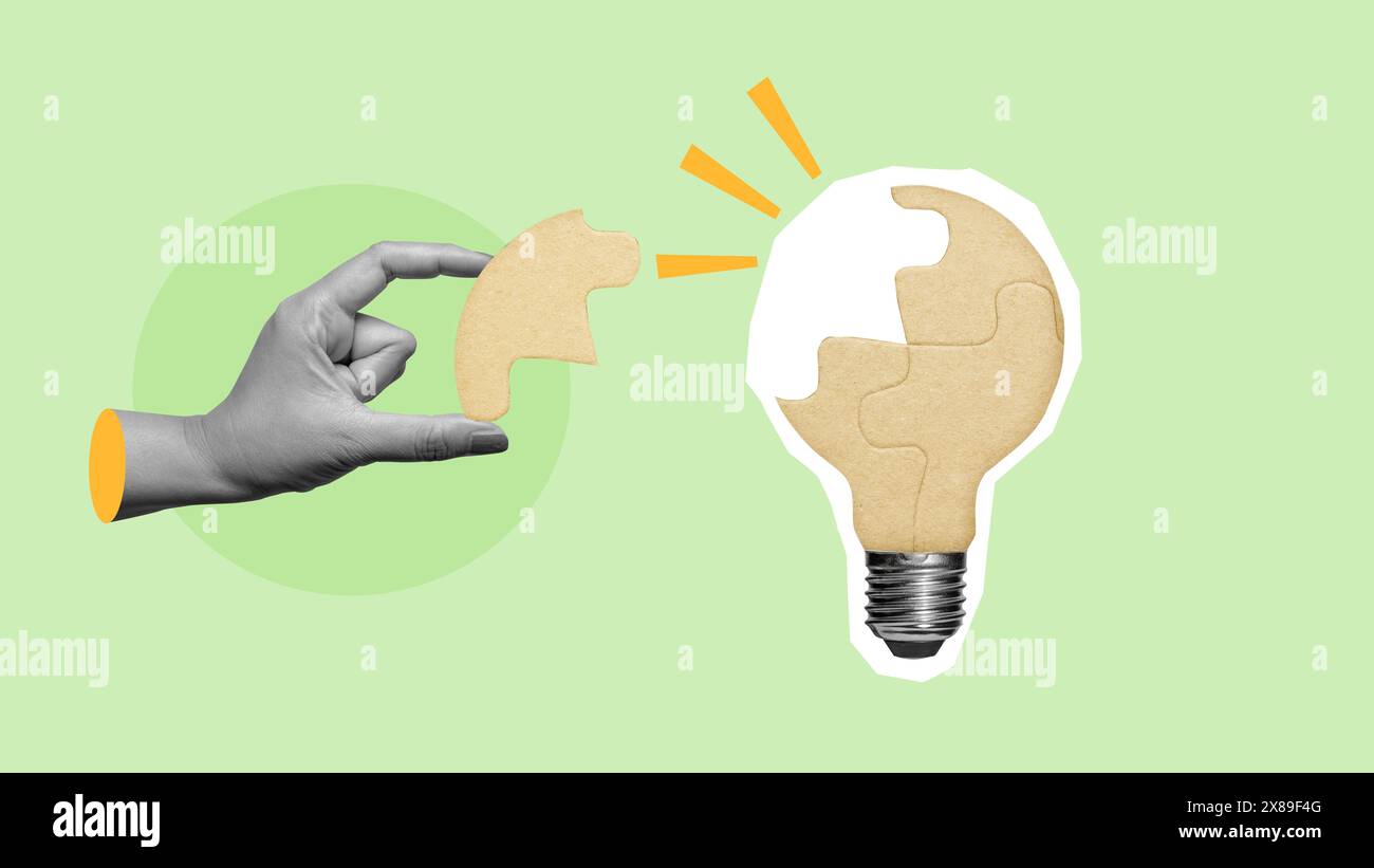 The human hand solves light bulb puzzles as a symbol for new ideas on a ...
