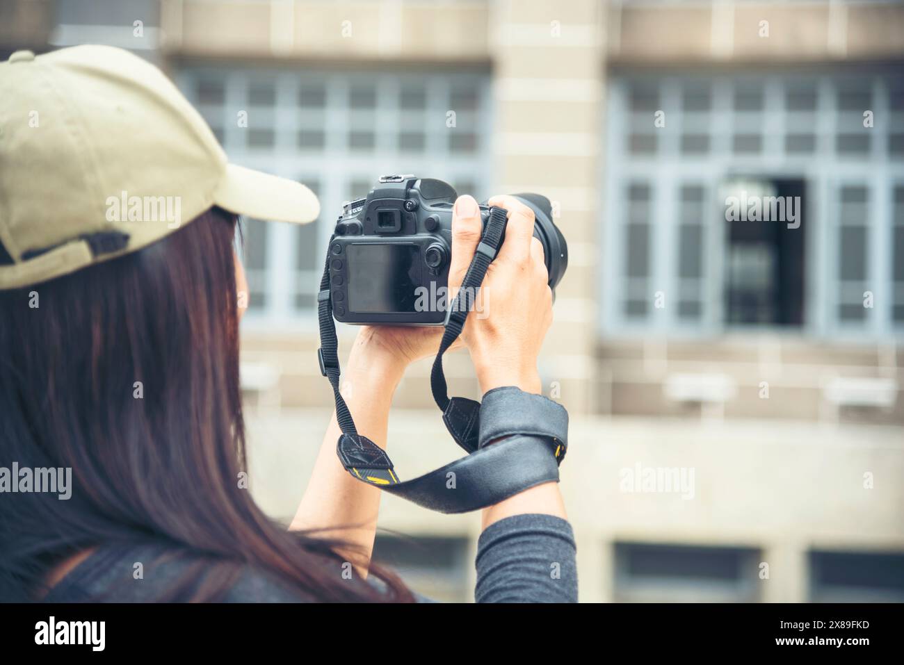 Asian tourist using dslr professional camera travel on vacation. Female ...