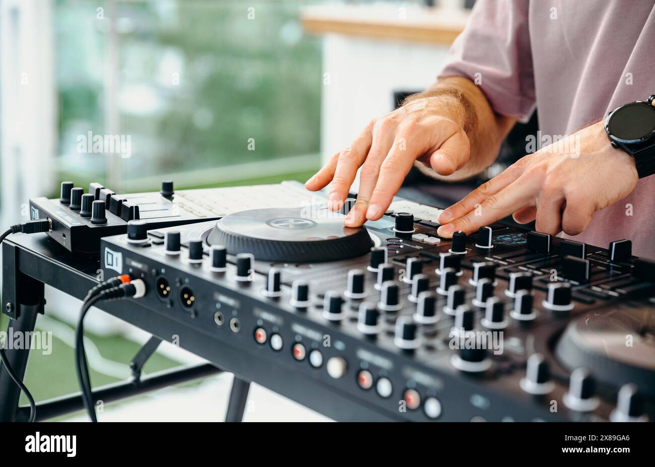 DJ hands on a DJ console Stock Photo - Alamy