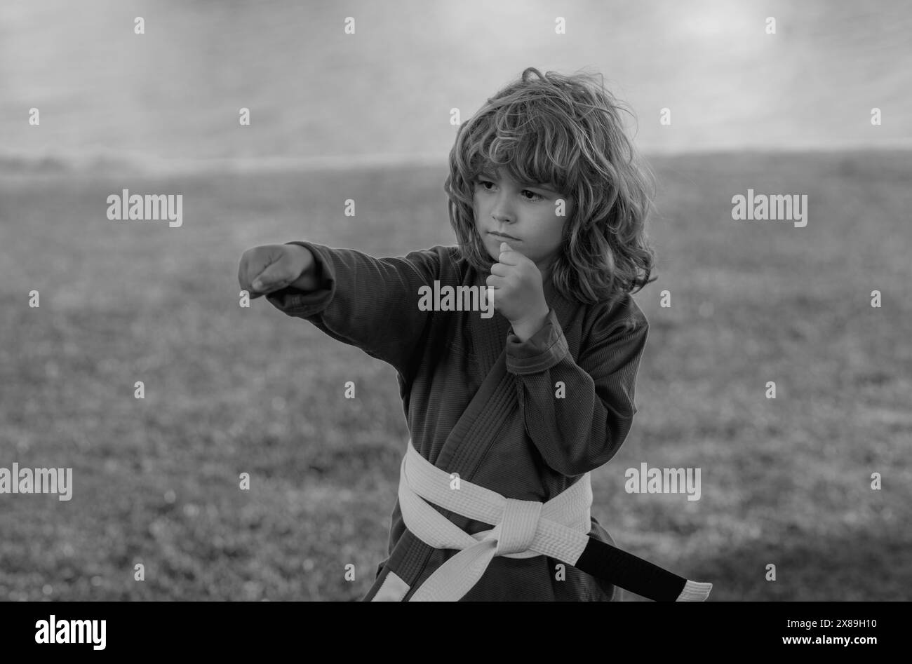 Kid boy practicing karate outdoor. Sport karate kids. Little boy ...