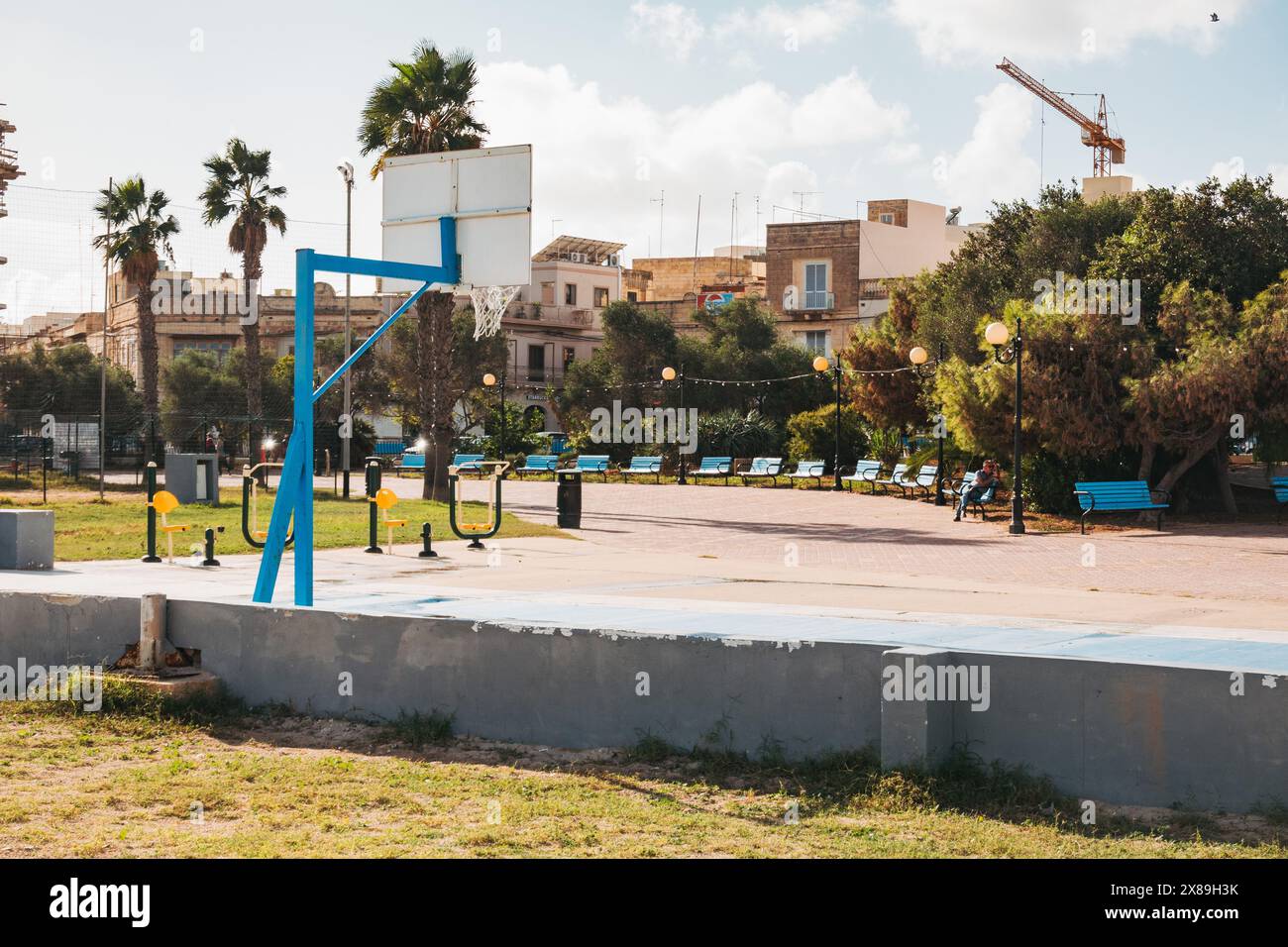 An empty basketball court and playground in Birżebbuġa, Malta, deserted ...