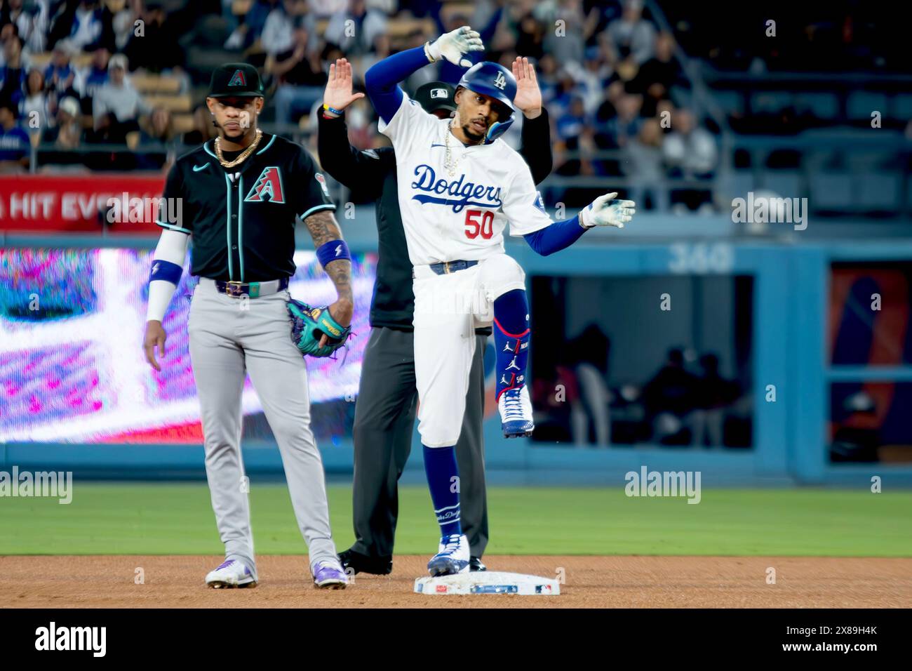 Los Angeles Dodgers shortstop Mookie Betts (50) hits a double during ...