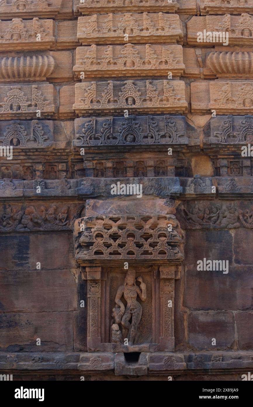Sculpture of Ardhanarishwar and Shikhara Carving Faces of Lord Buddha ...