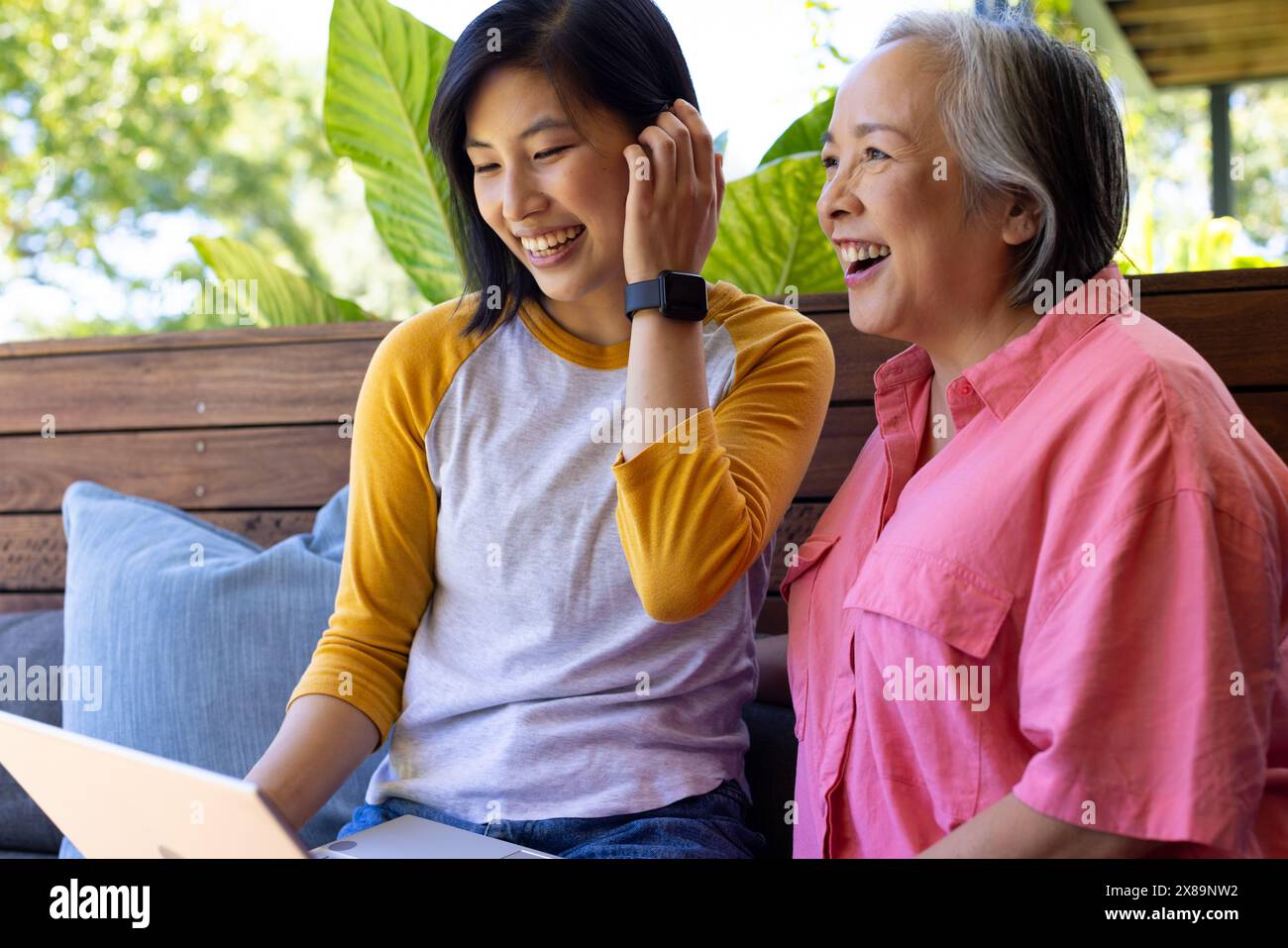 At home, Asian middle-aged mother and daughter studying laptop Stock Photo - Alamy
