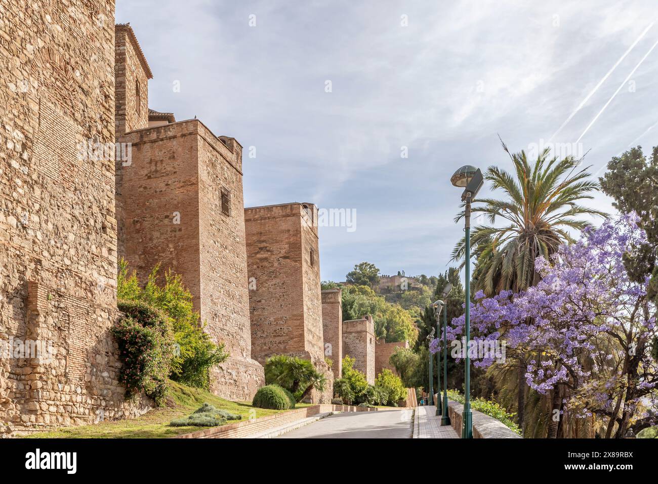 The walls of the ancient Alcazaba in Malaga, Spain, with Gibralfaro ...