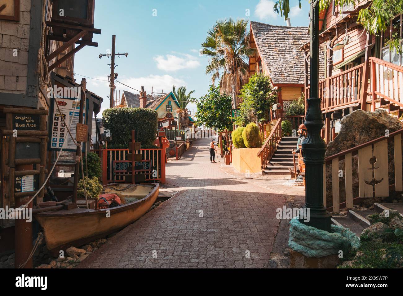 A tiled path through the main street of Popeye Village, a 1980s movie ...