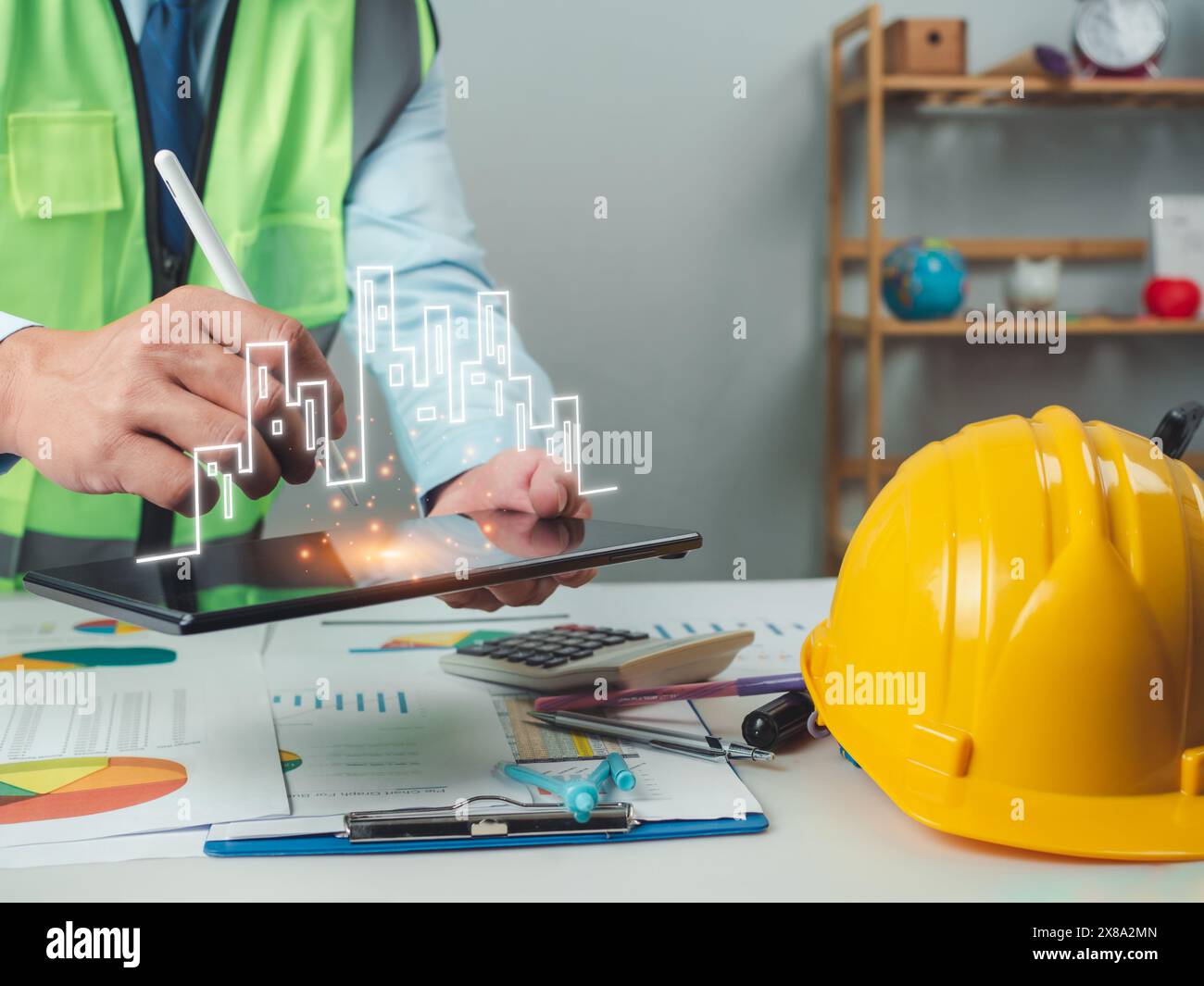 Architect Or Engineer Using Tablet To Work On Table Cost Calculation