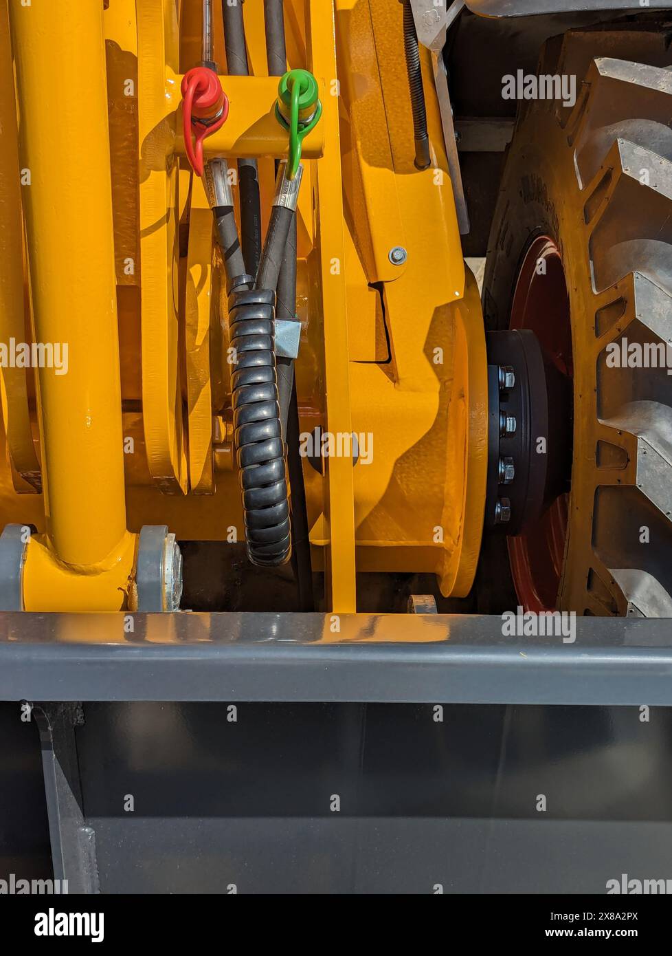 Yellow, bulldozer arm Stock Photo - Alamy