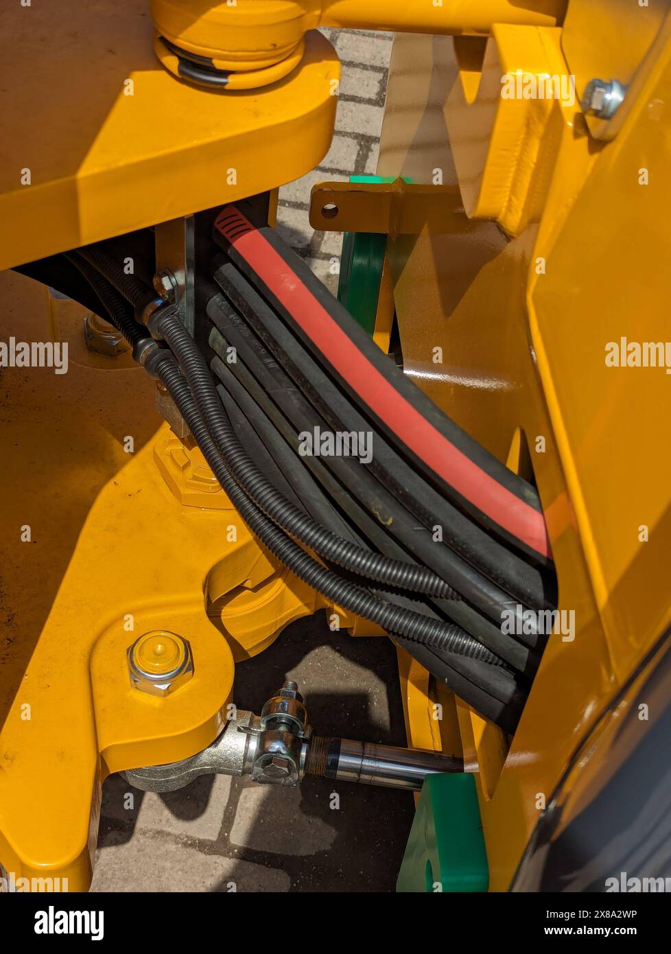 Yellow bulldozer arm, hydraulics tube Stock Photo - Alamy