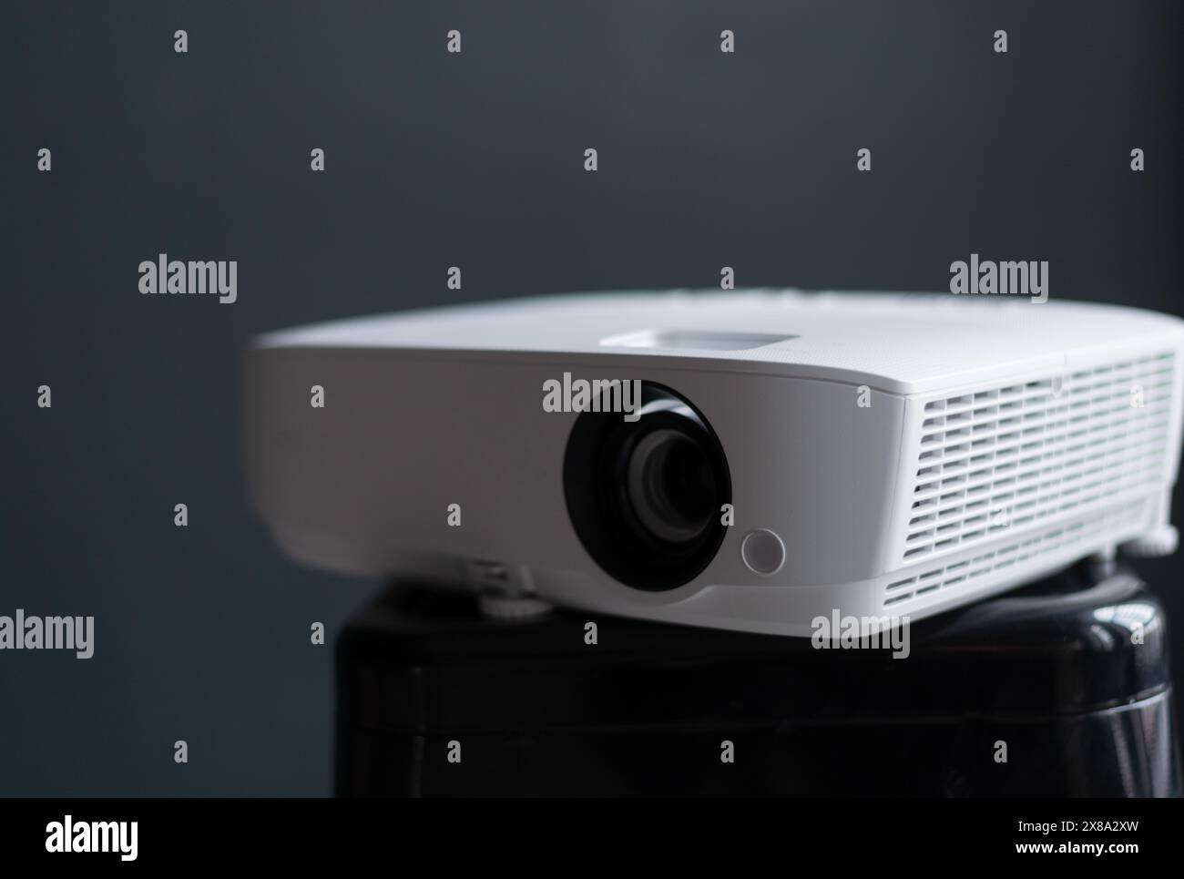 on table in dark blue tone projector home theater background Stock ...