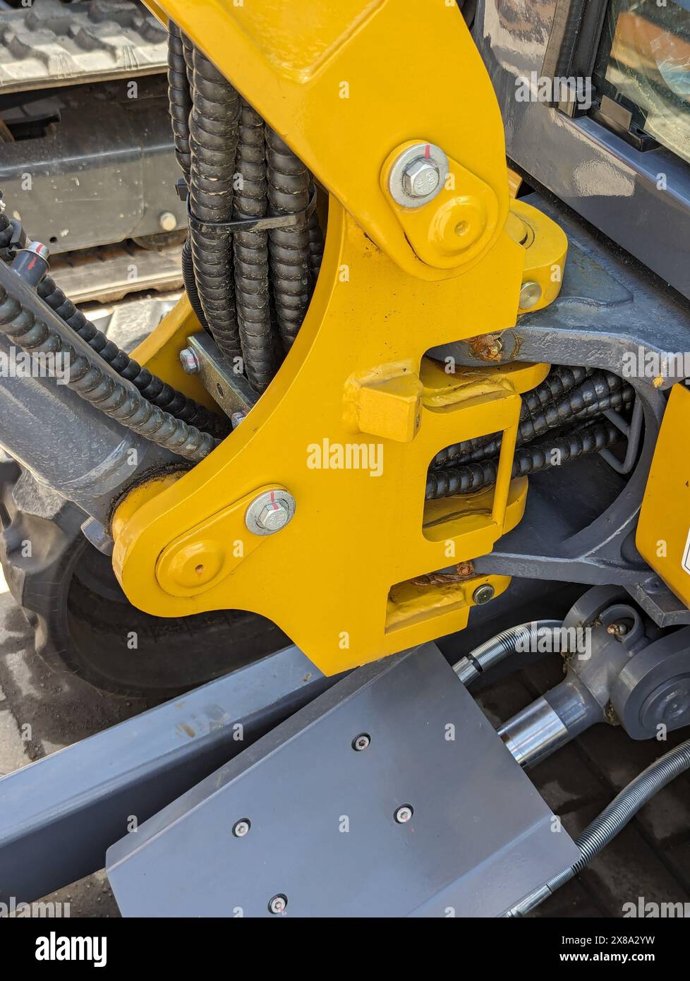 Yellow bulldozer arm, hydraulics tube Stock Photo - Alamy
