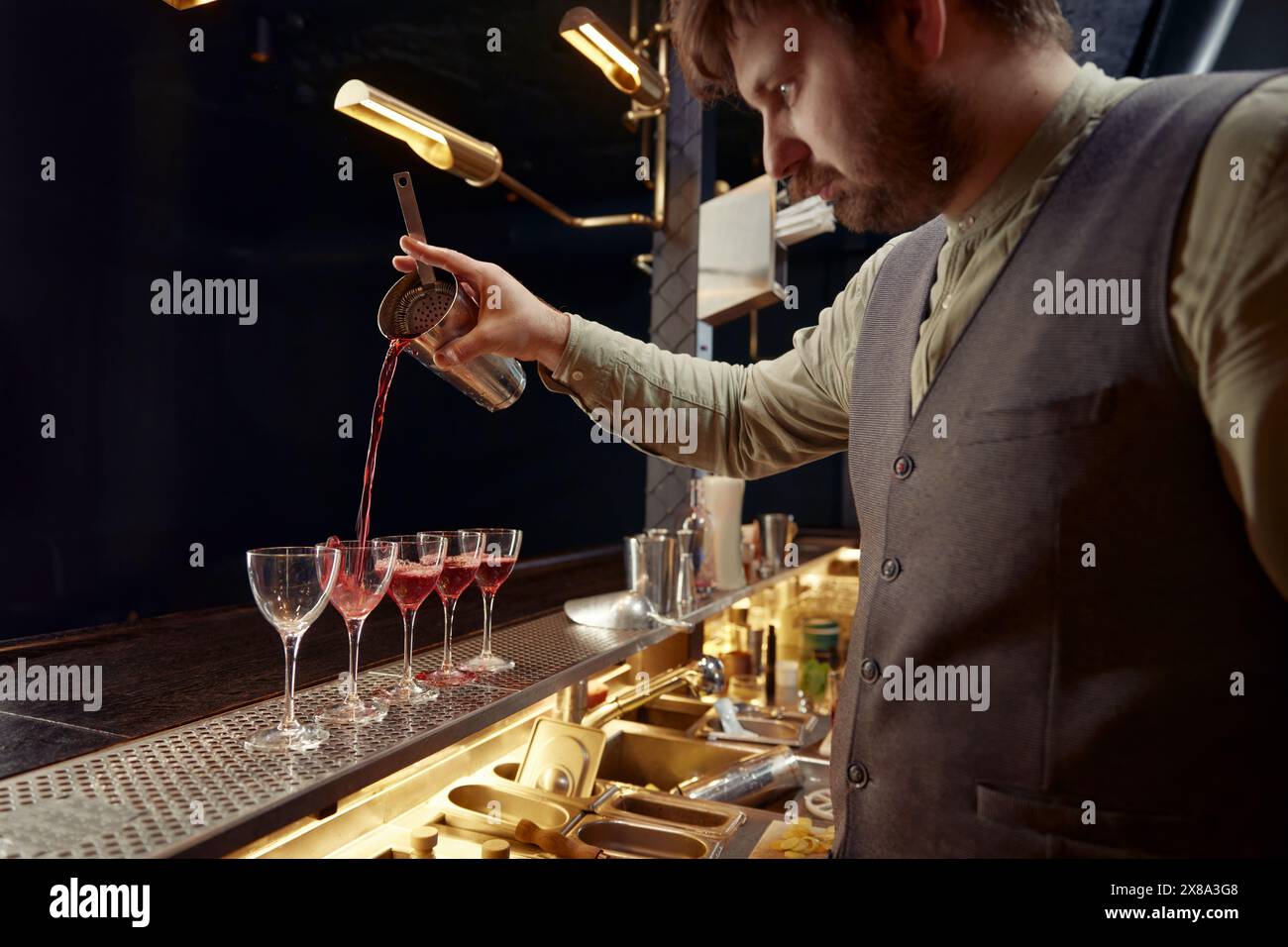 Bartender pouring freshly prepared hi-res stock photography and images ...