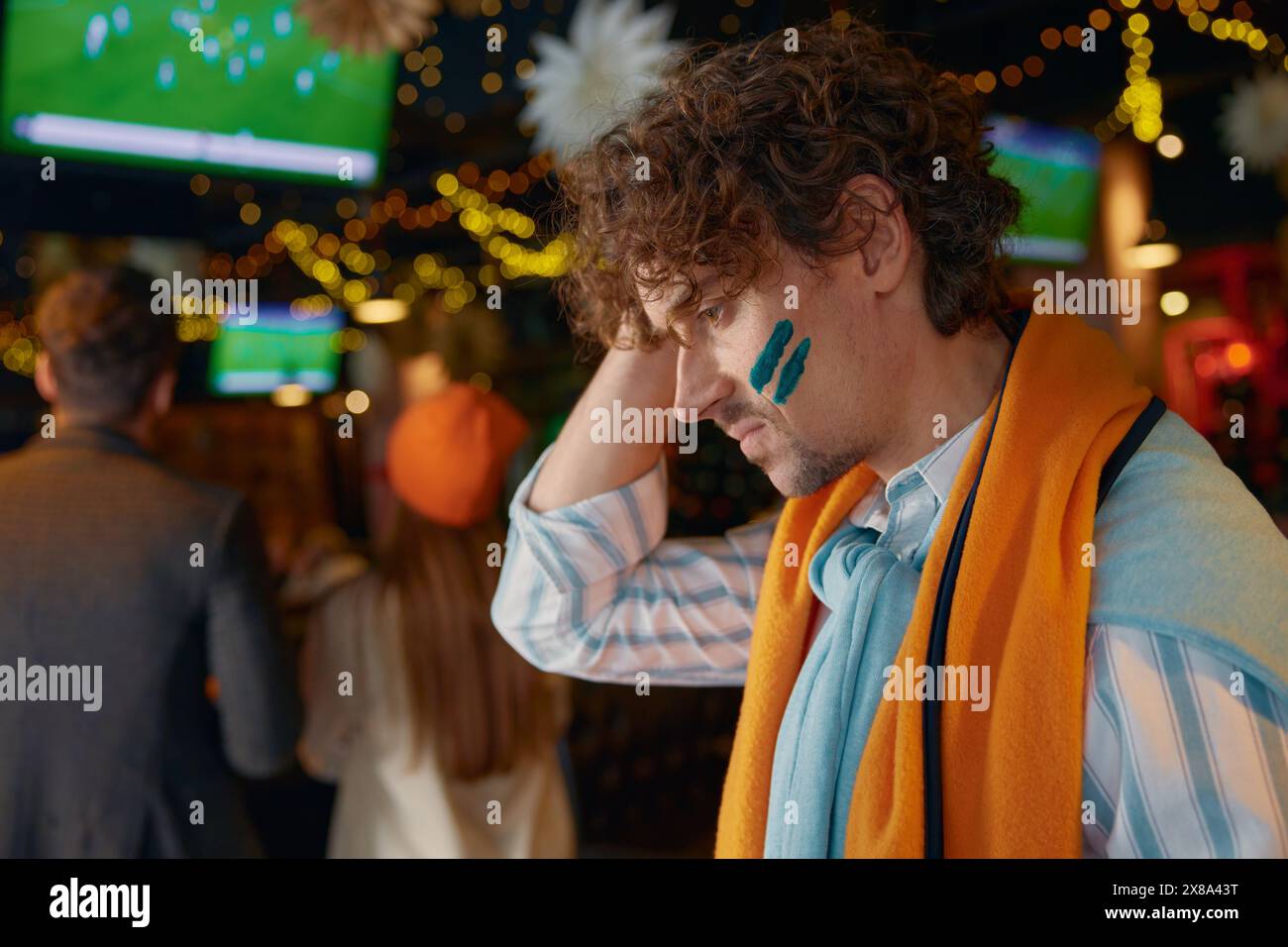 Frustrated sad man football fan touching head due to loss of favorite ...