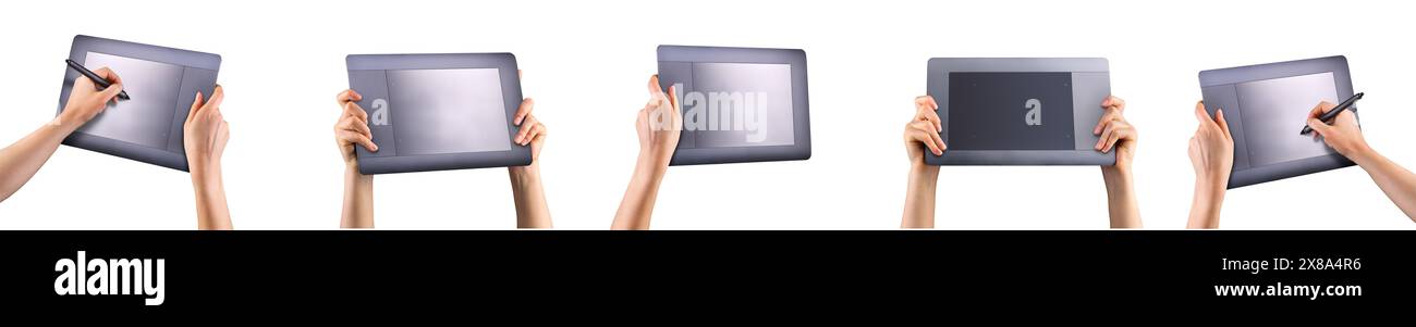 Hand holding digital graphic pen and drawing graphic tablet for ...