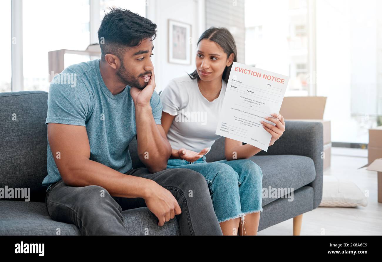 Frustrated couple eviction documents hi-res stock photography and ...