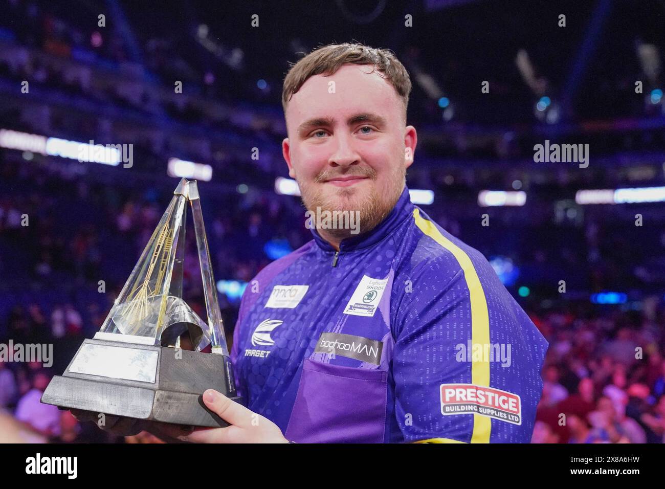 London, UK. 23rd May, 2024. Luke Littler with the trophy during the ...