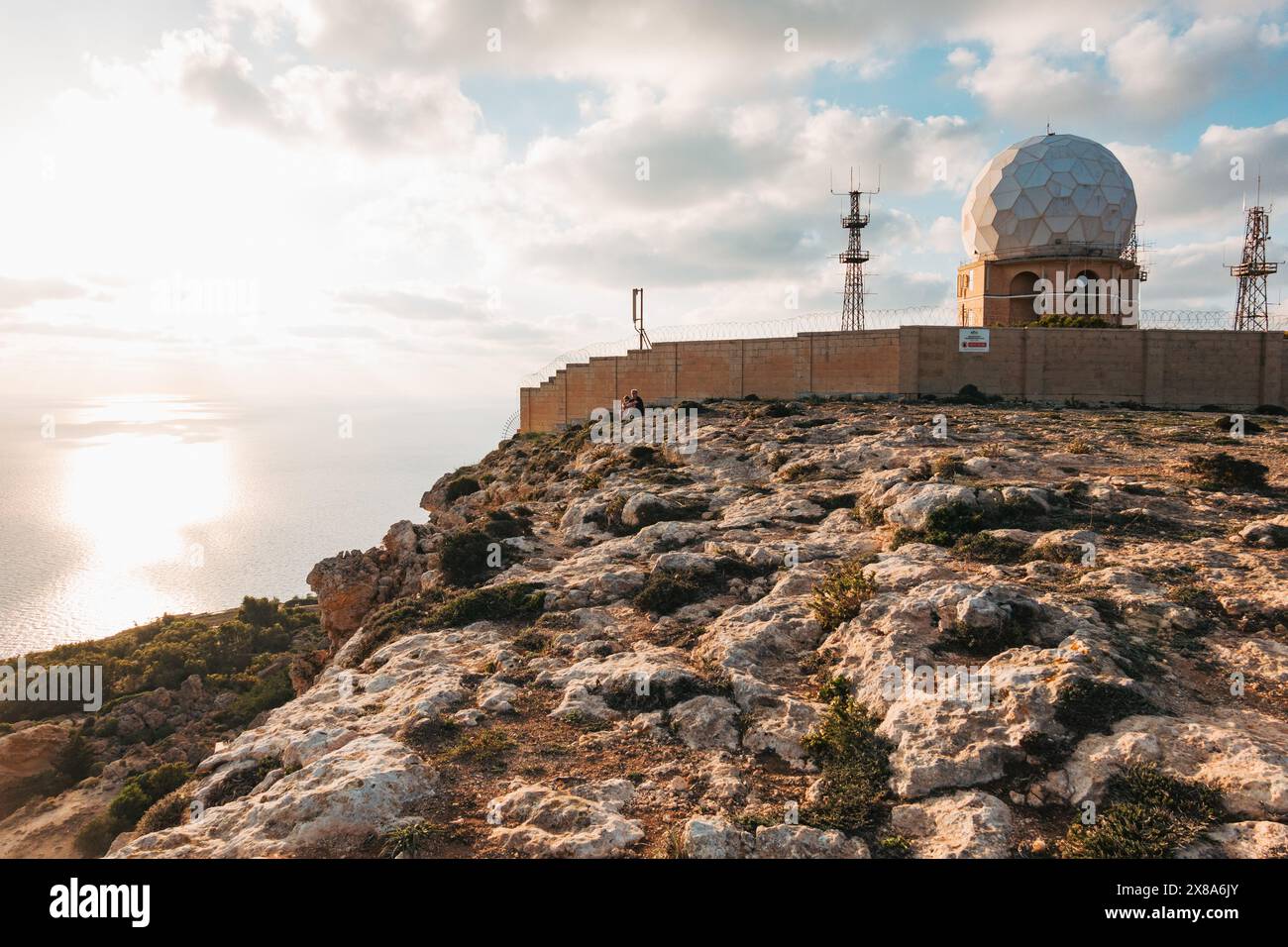 An aviation radar dome perched on the southern coast of the island of ...