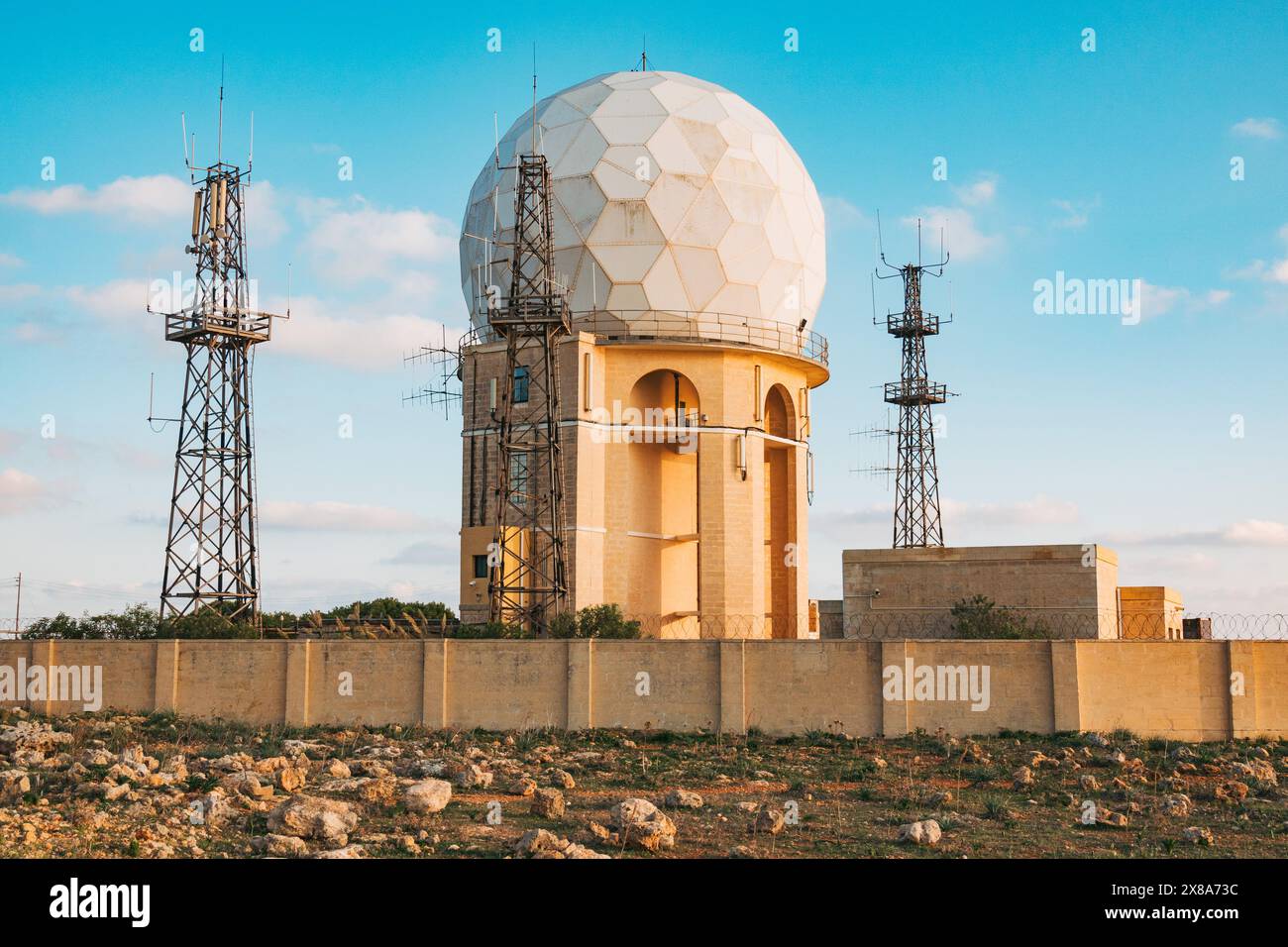 An aviation radar dome perched on the southern coast of the island of ...