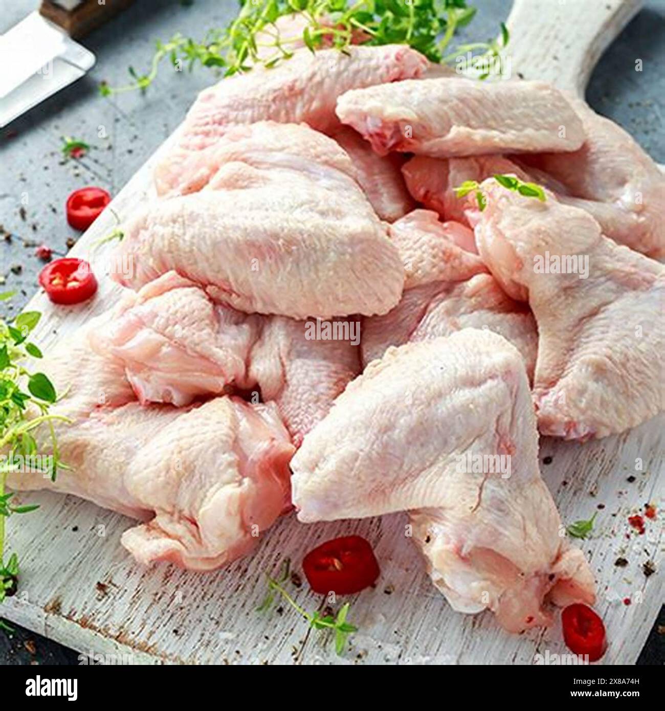 raw chicken wings well presented Stock Photo - Alamy