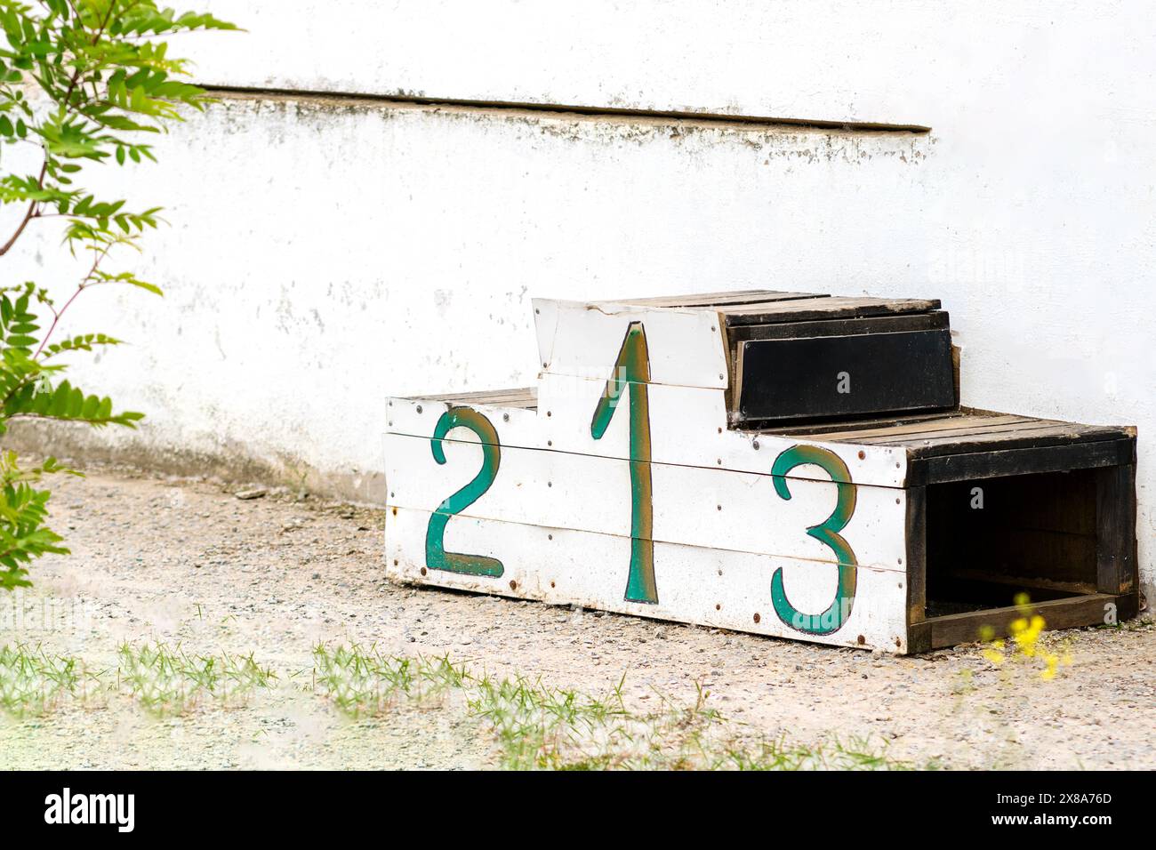 Old wooden podium with numbers 1, 2, and 3 for winners Stock Photo - Alamy