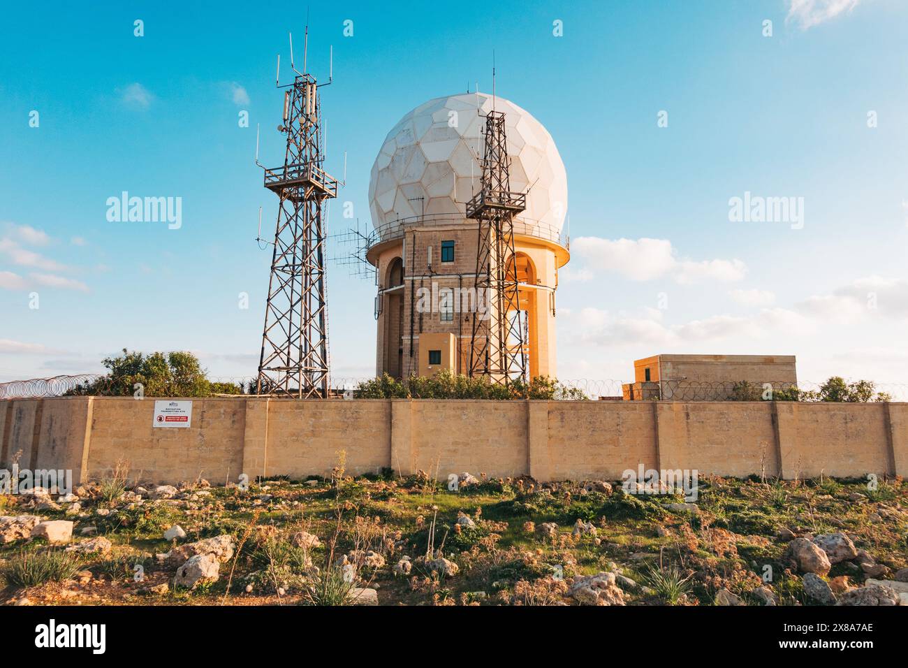 An aviation radar dome perched on the southern coast of the island of ...