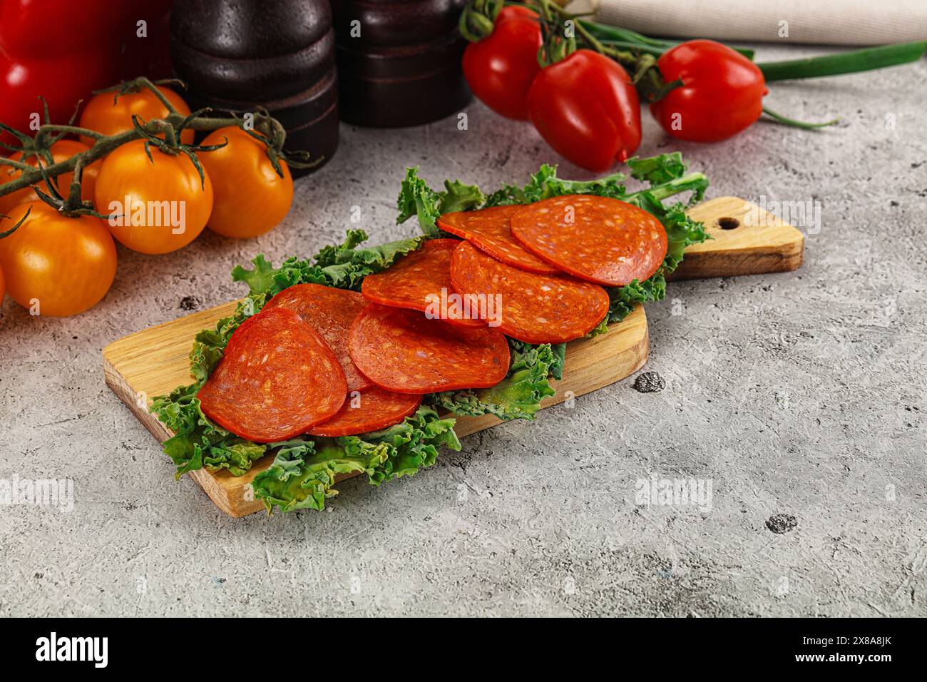 Spanish salami cured chorizo sausage slices Stock Photo - Alamy