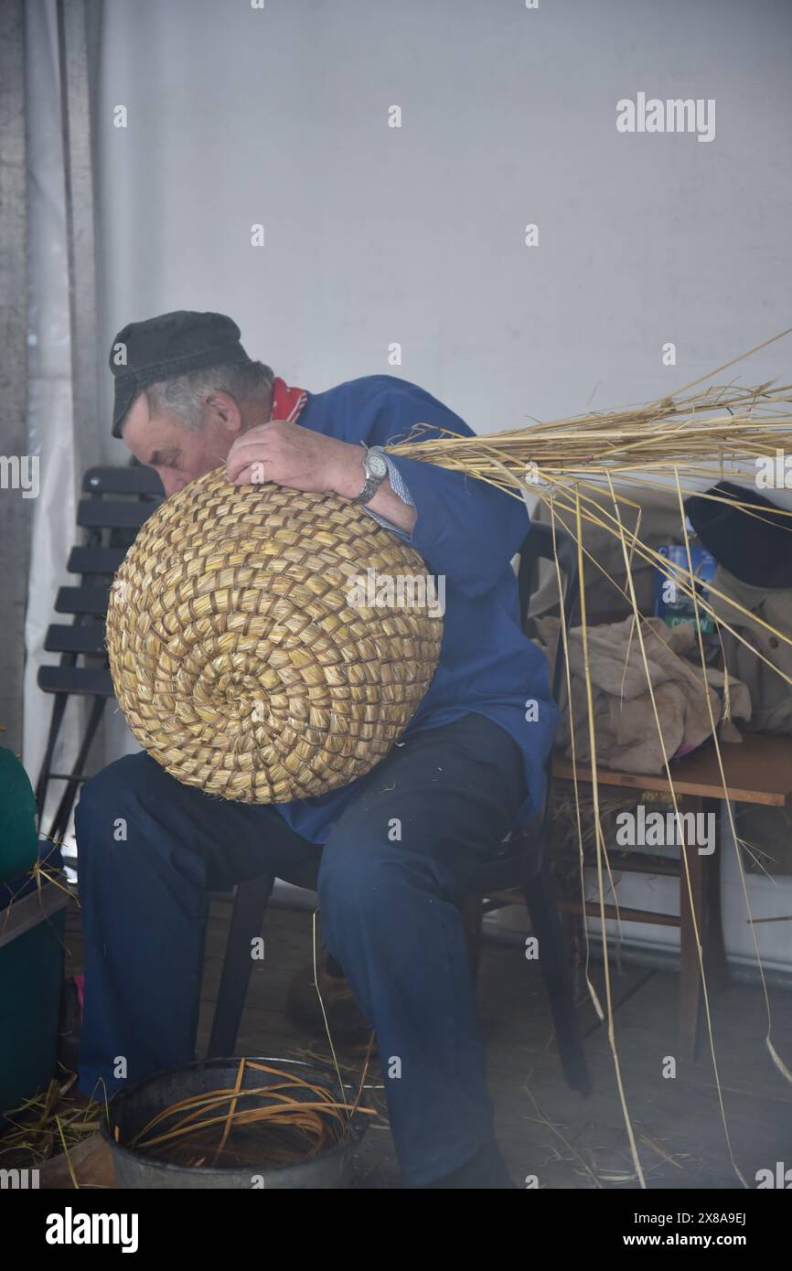 Man with wood basket hi-res stock photography and images - Alamy
