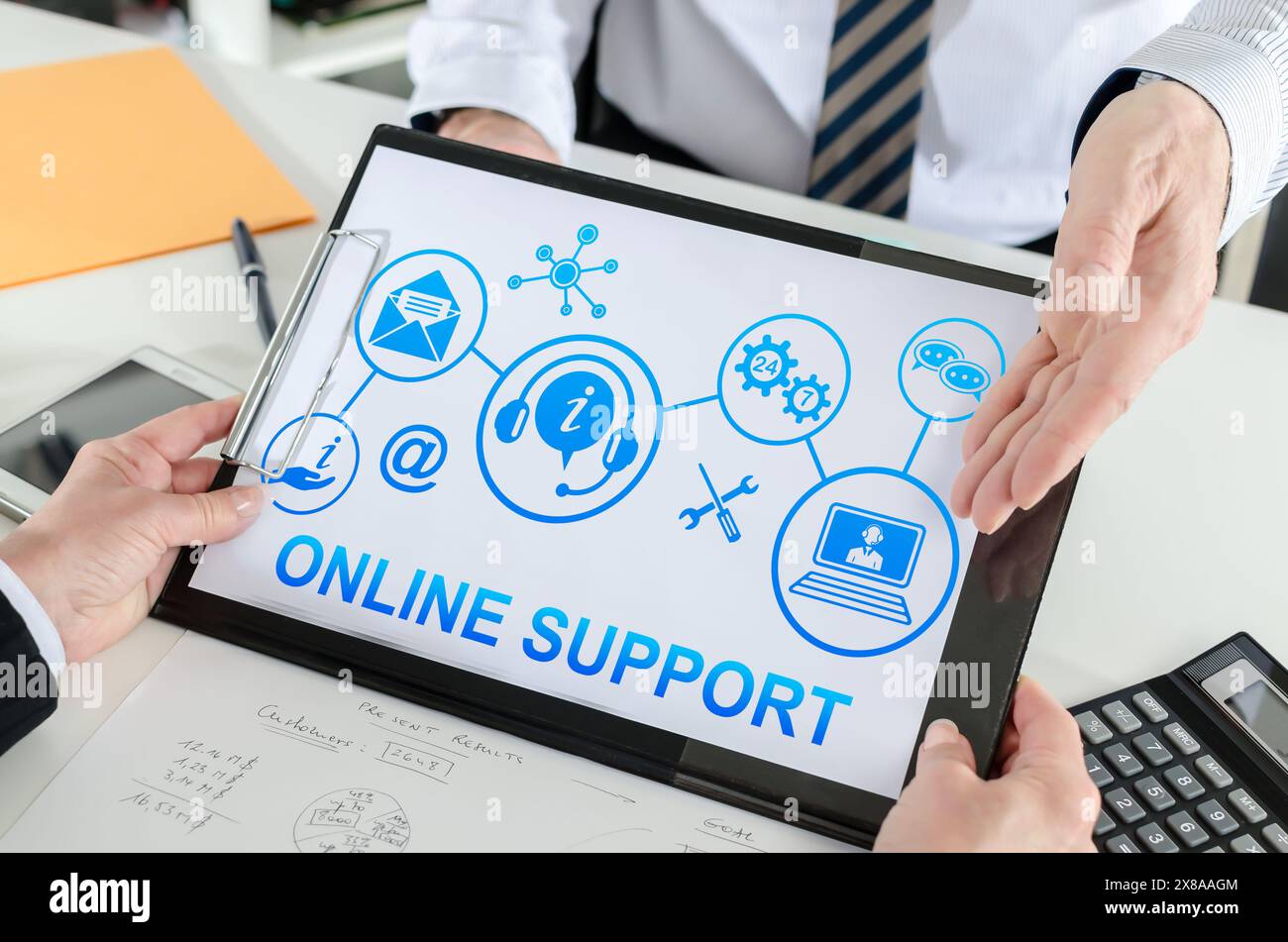 Online support concept shown by a businessman Stock Photo - Alamy
