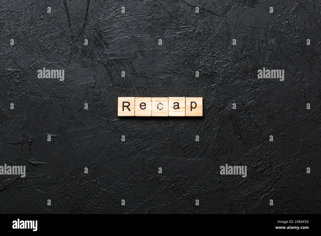 recap word written on wood block. recap text on table, concept Stock ...