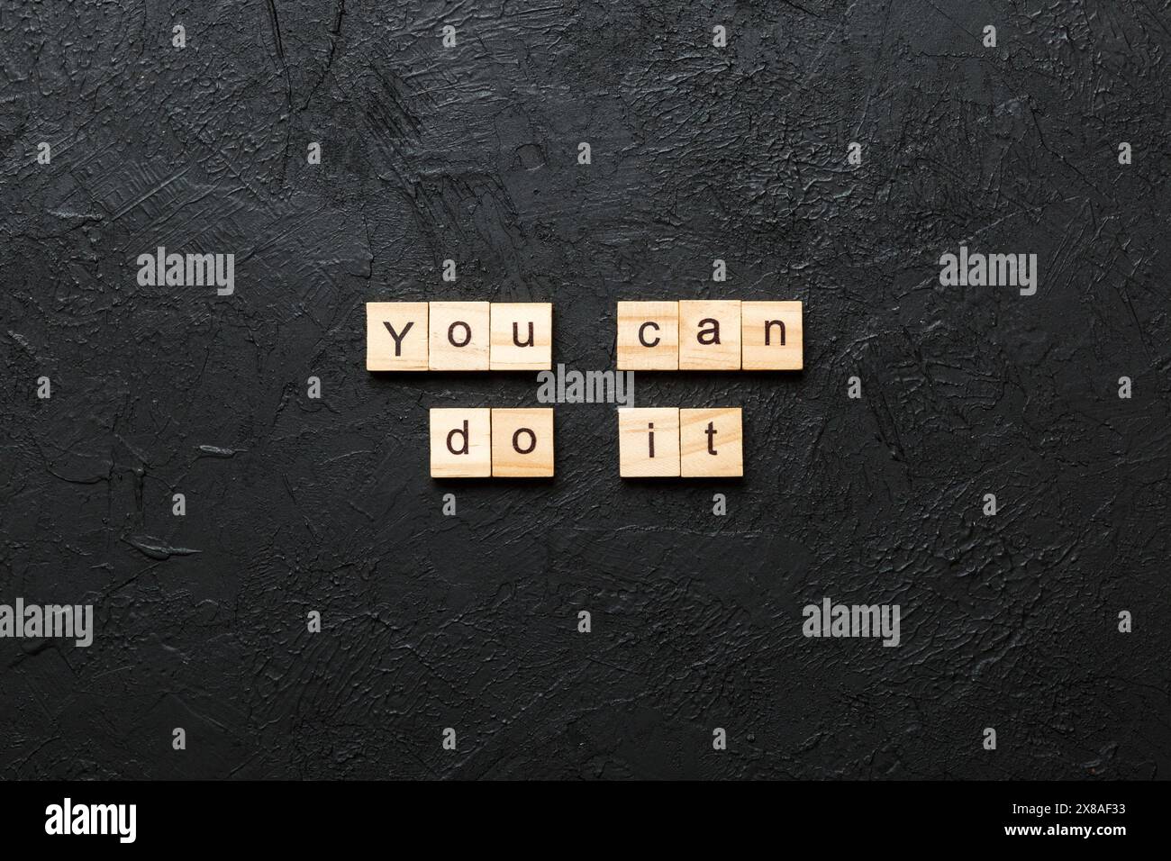 you can do it word written on wood block. you can do it text on table ...