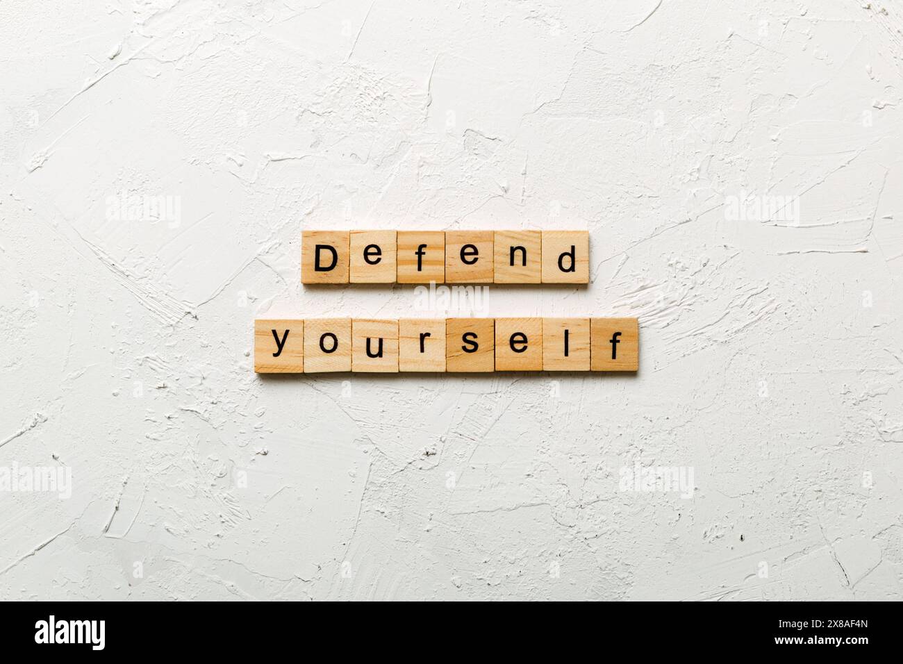 defend yourself word written on wood block. defend yourself text on ... defend yourself word written on wood block. defend yourself text on ...