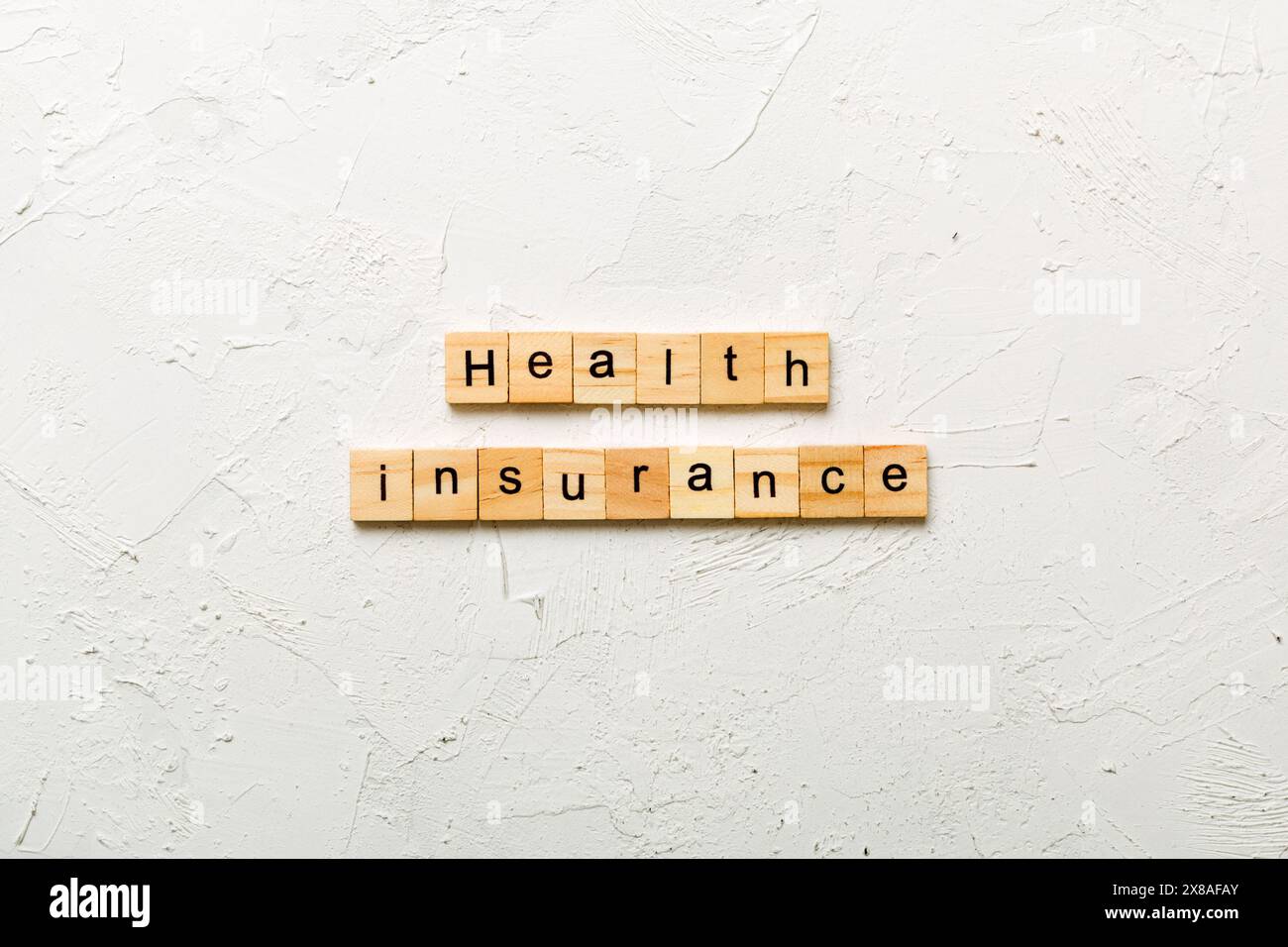 Health insurance word written on wood block. Health insurance text on ...