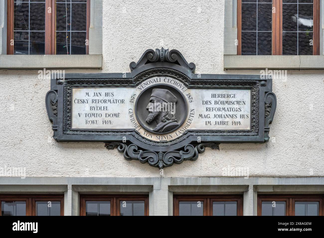 Relief with portrait of Jan Hus on the façade of a medieval house, now ...