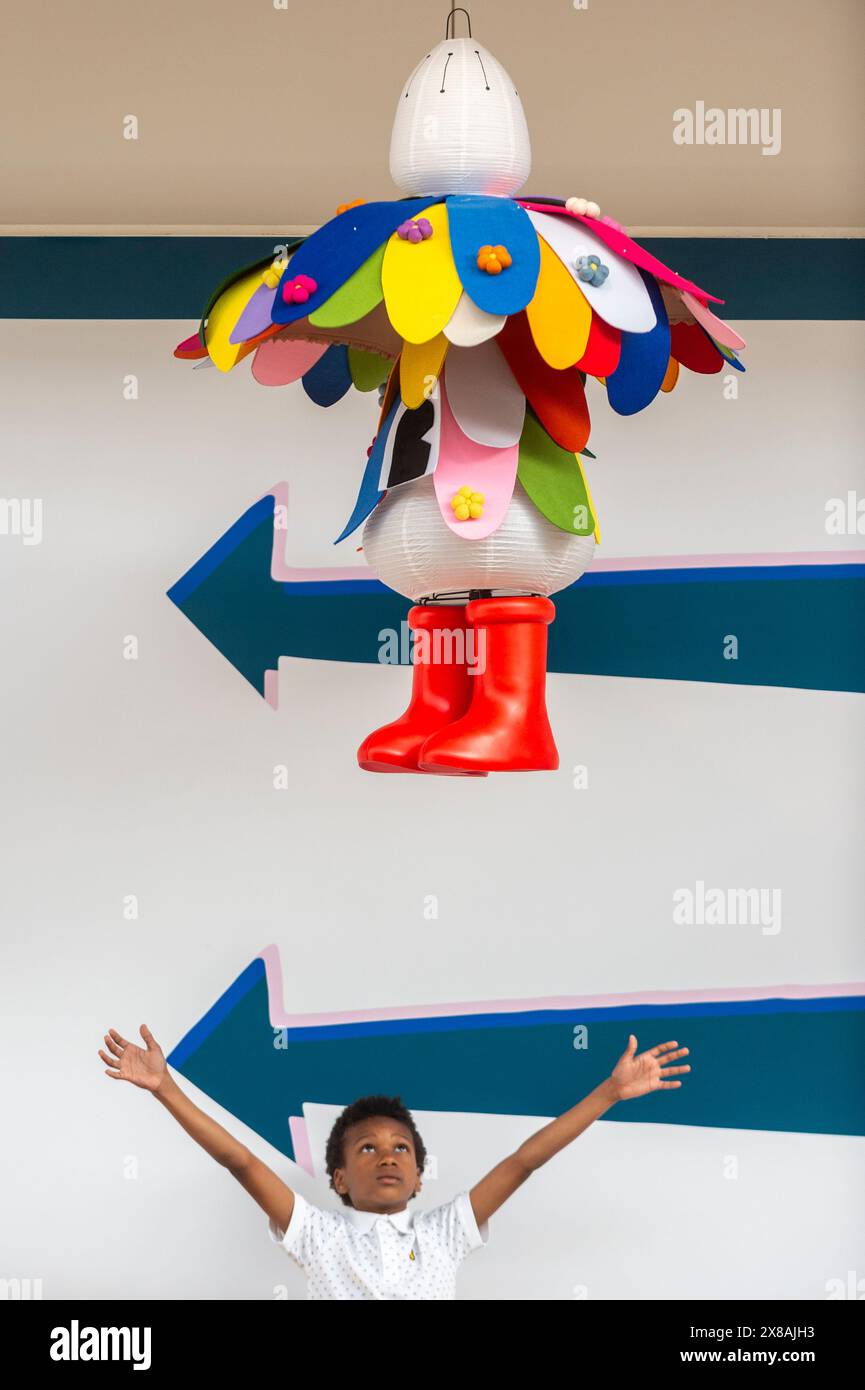 London, UK. 24 May 2024. Kayeron, aged 8, interacts with Murugiah ...