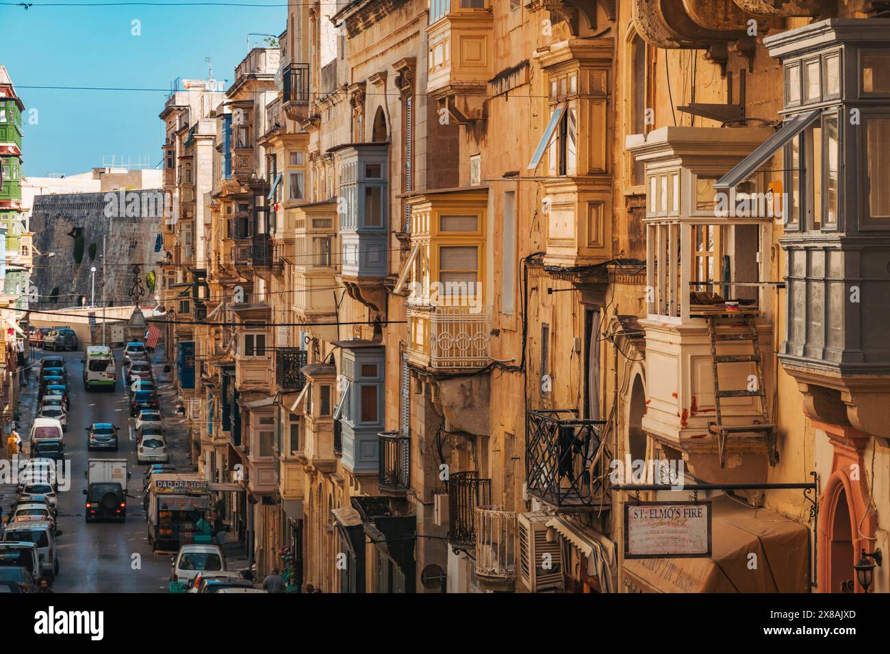 Apartments on a street in Valletta, Malta featuring 'gallariji ...