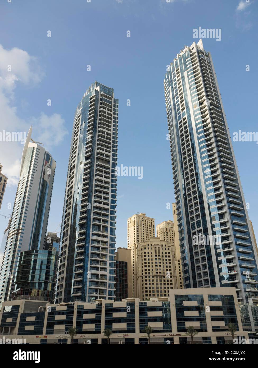 Towering skyscrapers against a clear blue sky in Dubai, modern skyline ...