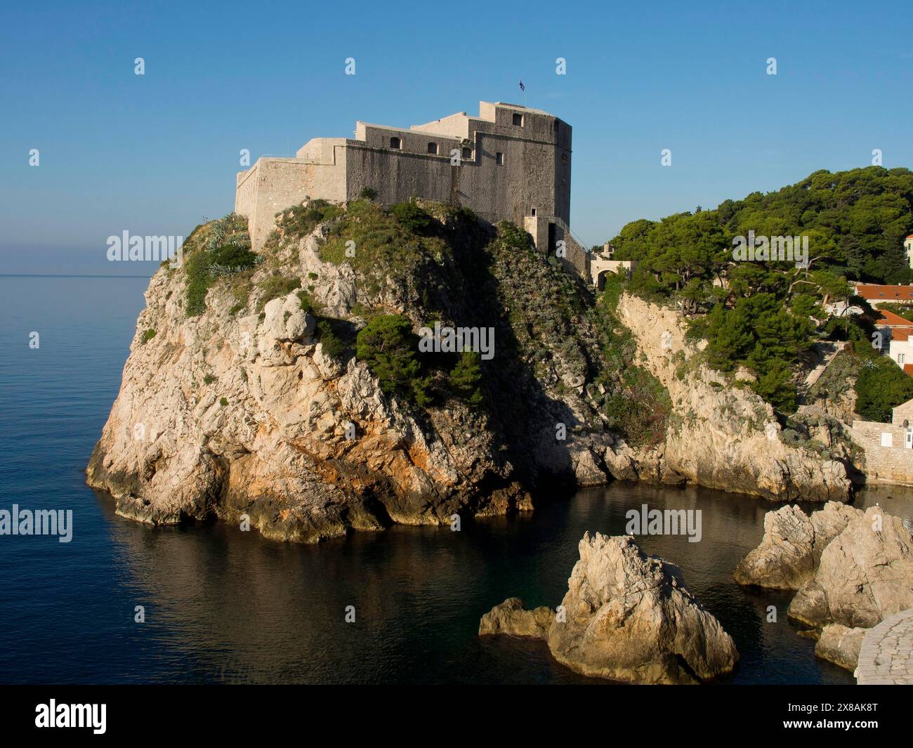 Mighty fortress on a rock above the sea with stone walls and coastal ...