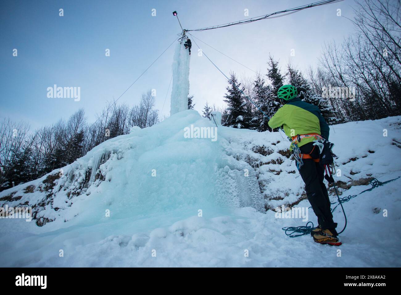 Ice climber being belayed in KitzbÃ¼hel, Tyrolean Alps Stock Photo - Alamy