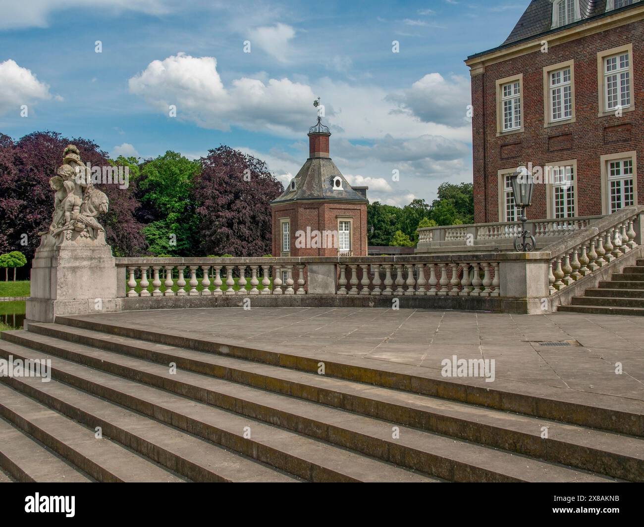 Stone steps and decorative railings lead to a historic building with ...