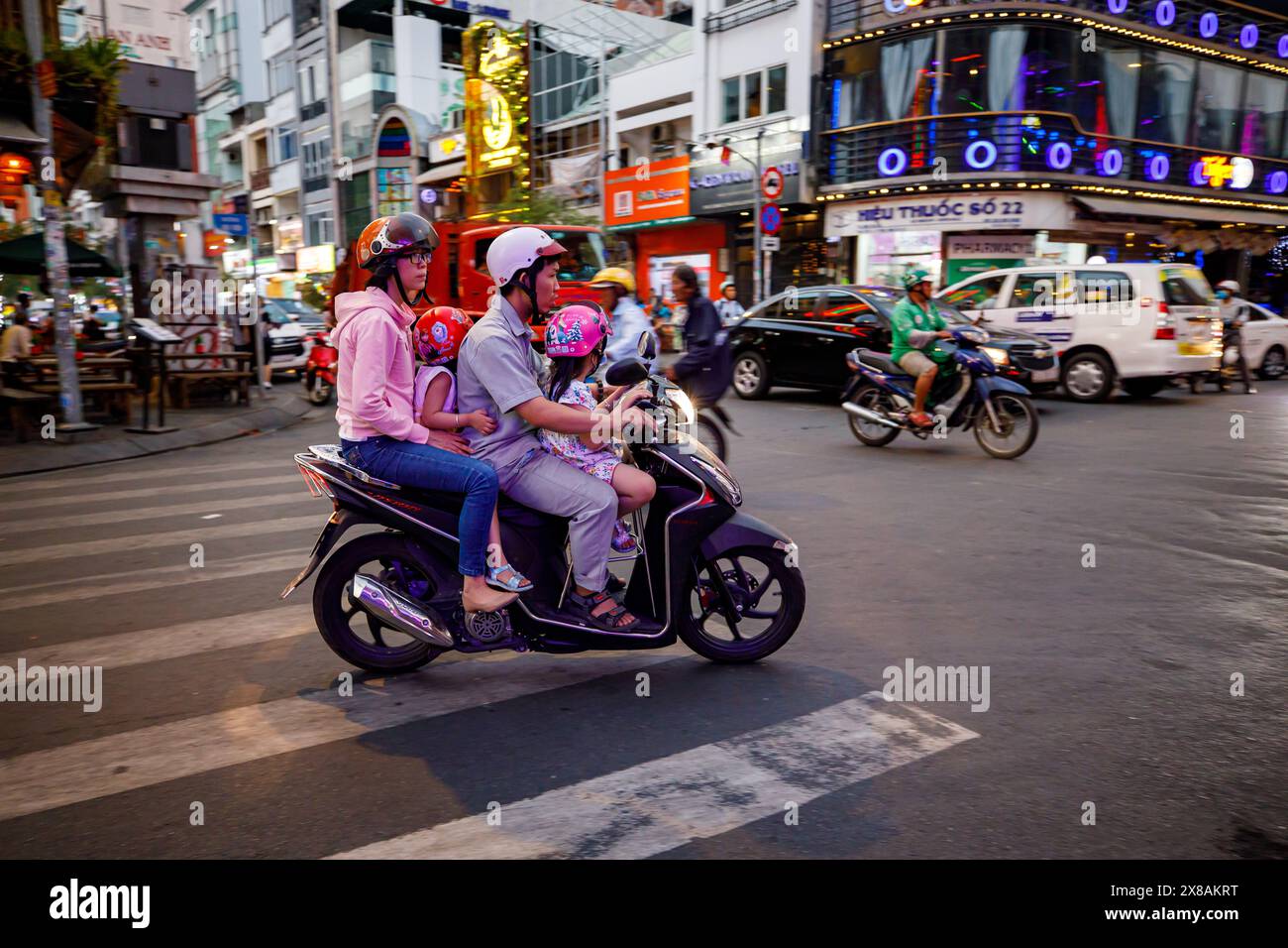 The traffic and motorcycle ride in the city of Saigon in Vietnam Stock ...